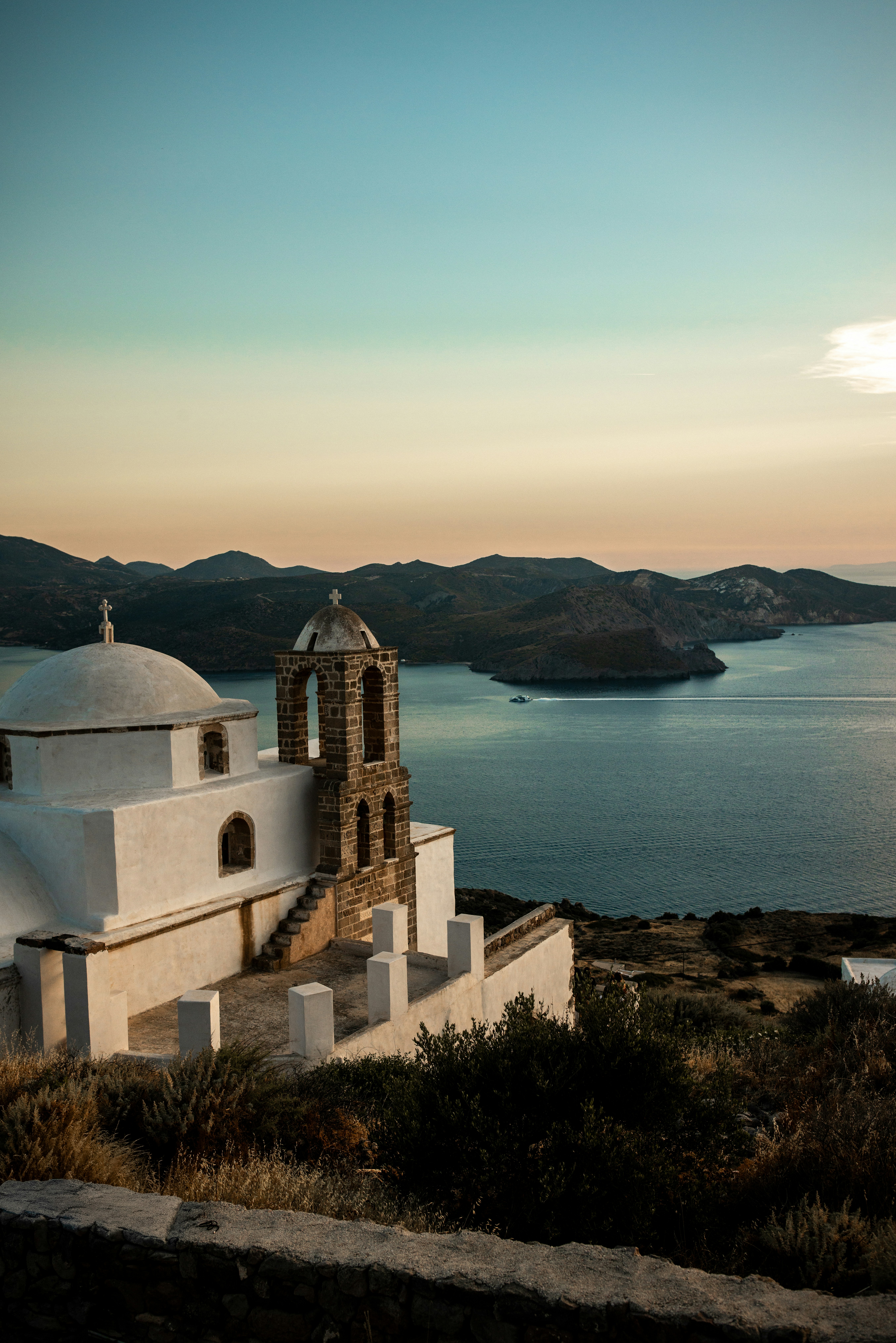 Sunset Over Whitewashed Bell-Tower in Aegean Calm
