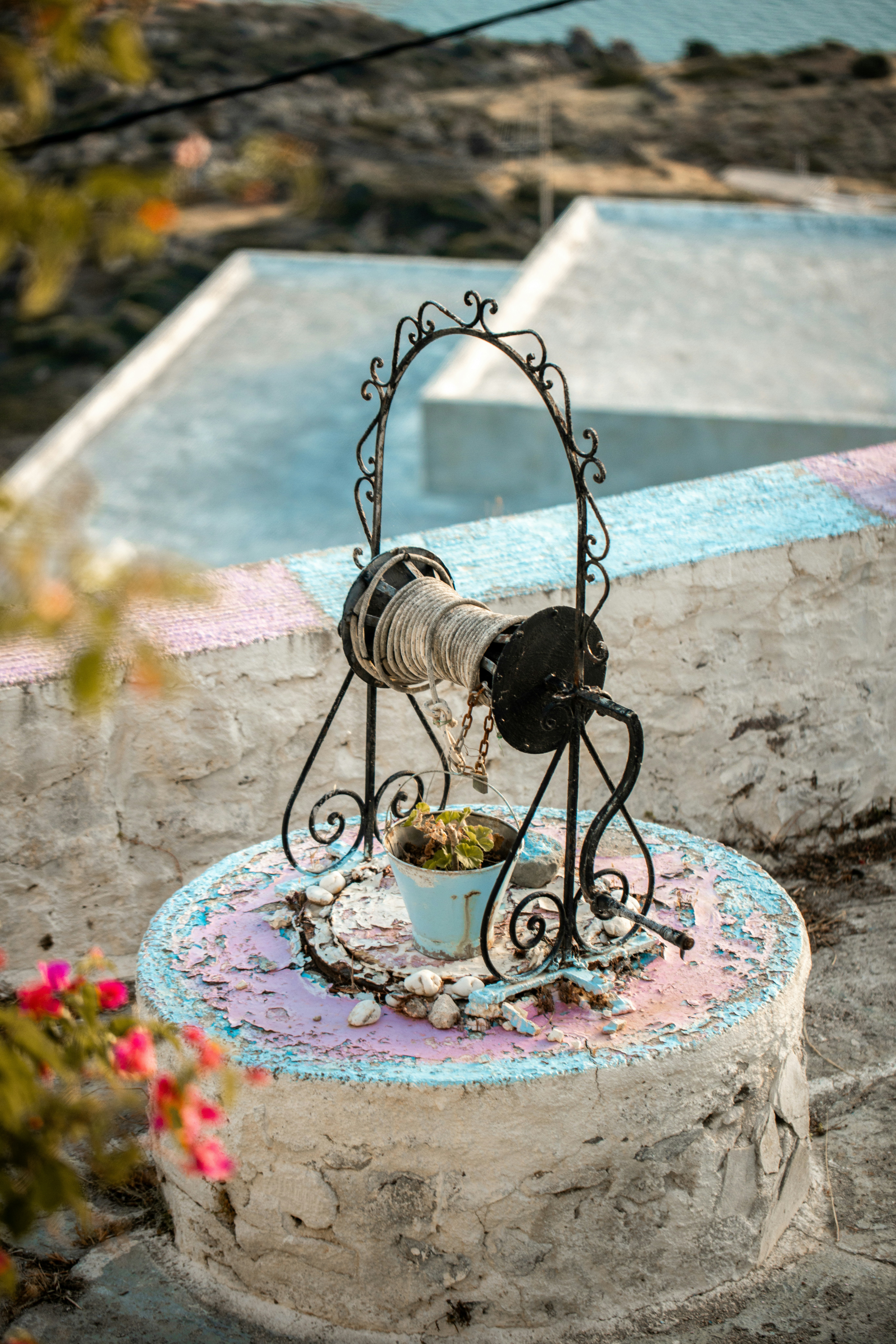 Rustic Spool Mechanism on a Weathered Pedestal