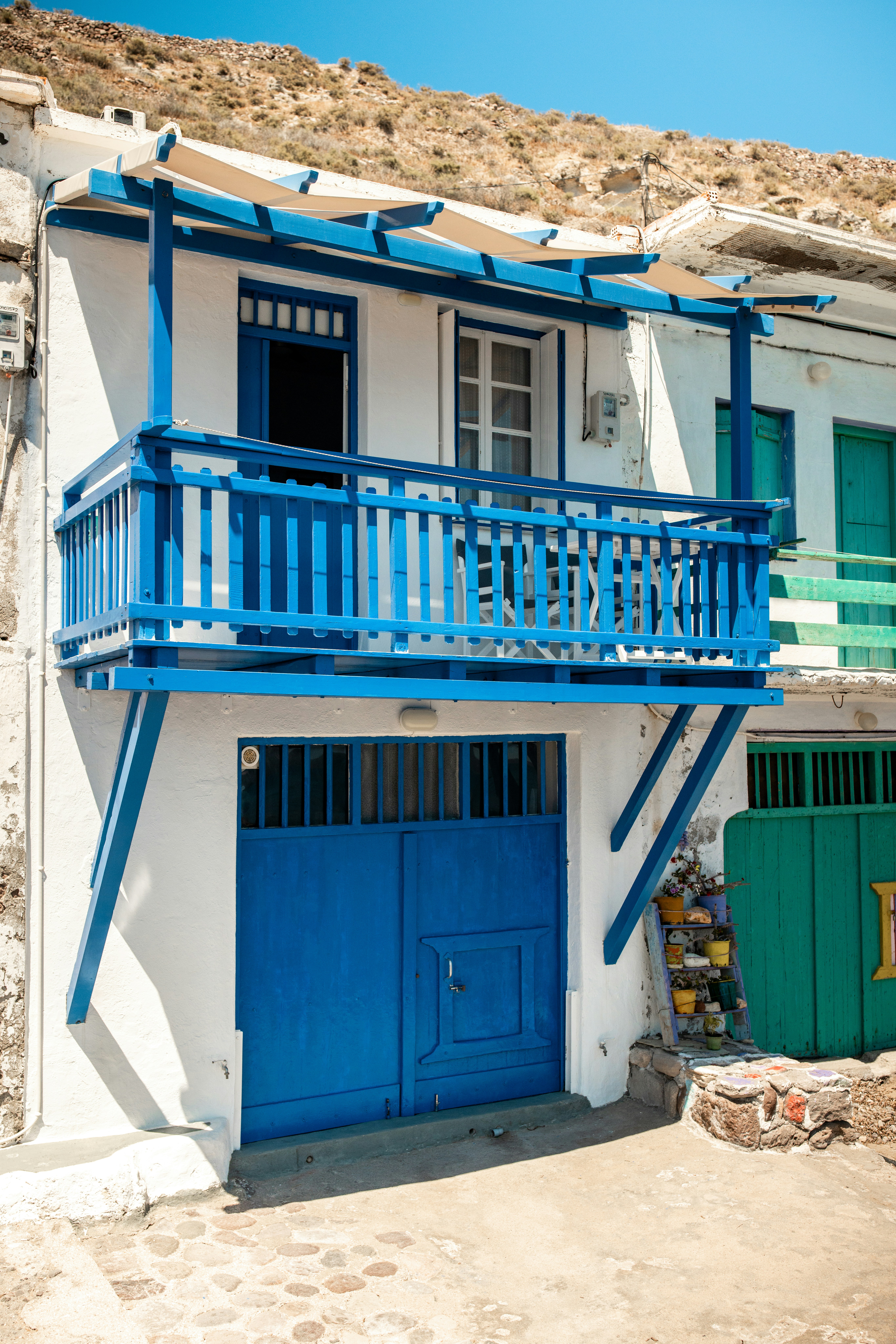Azure Balcony on a Mediterranean white-washed Facade
