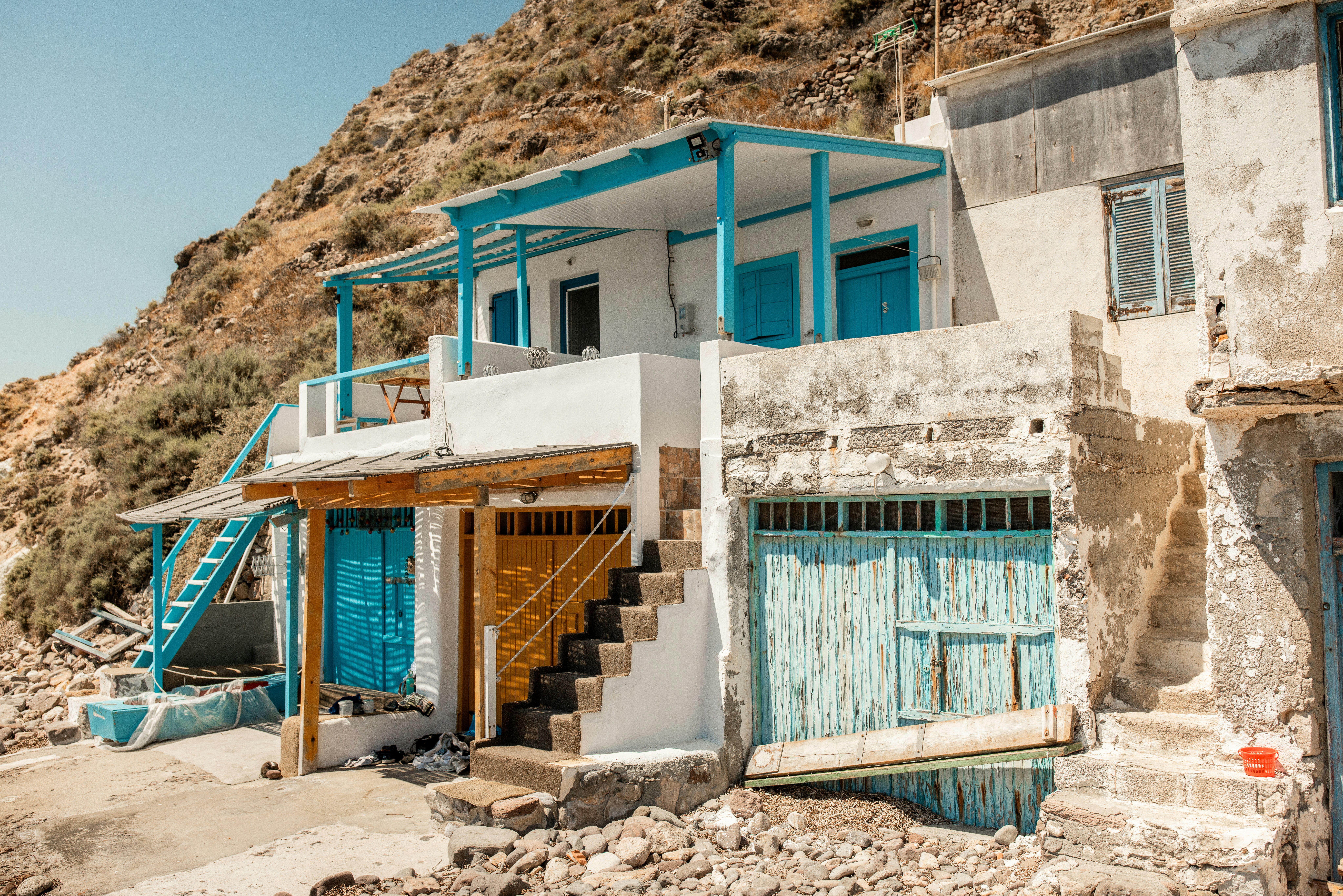 Blue Staircase to the Sea: Acluster of charm on a sunlit seaside cliff