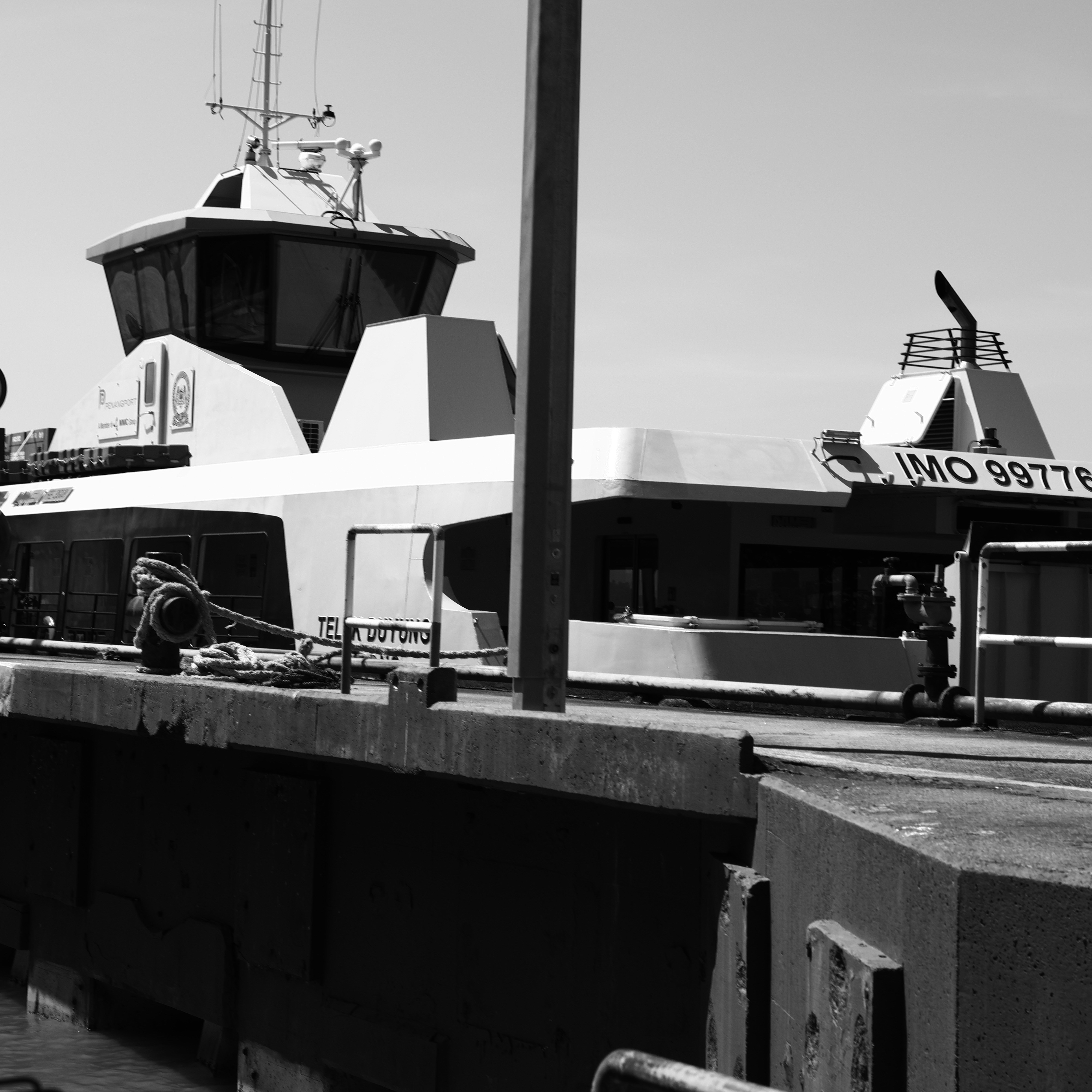 Harbor Tug at Dusk: A Monochrome Wake