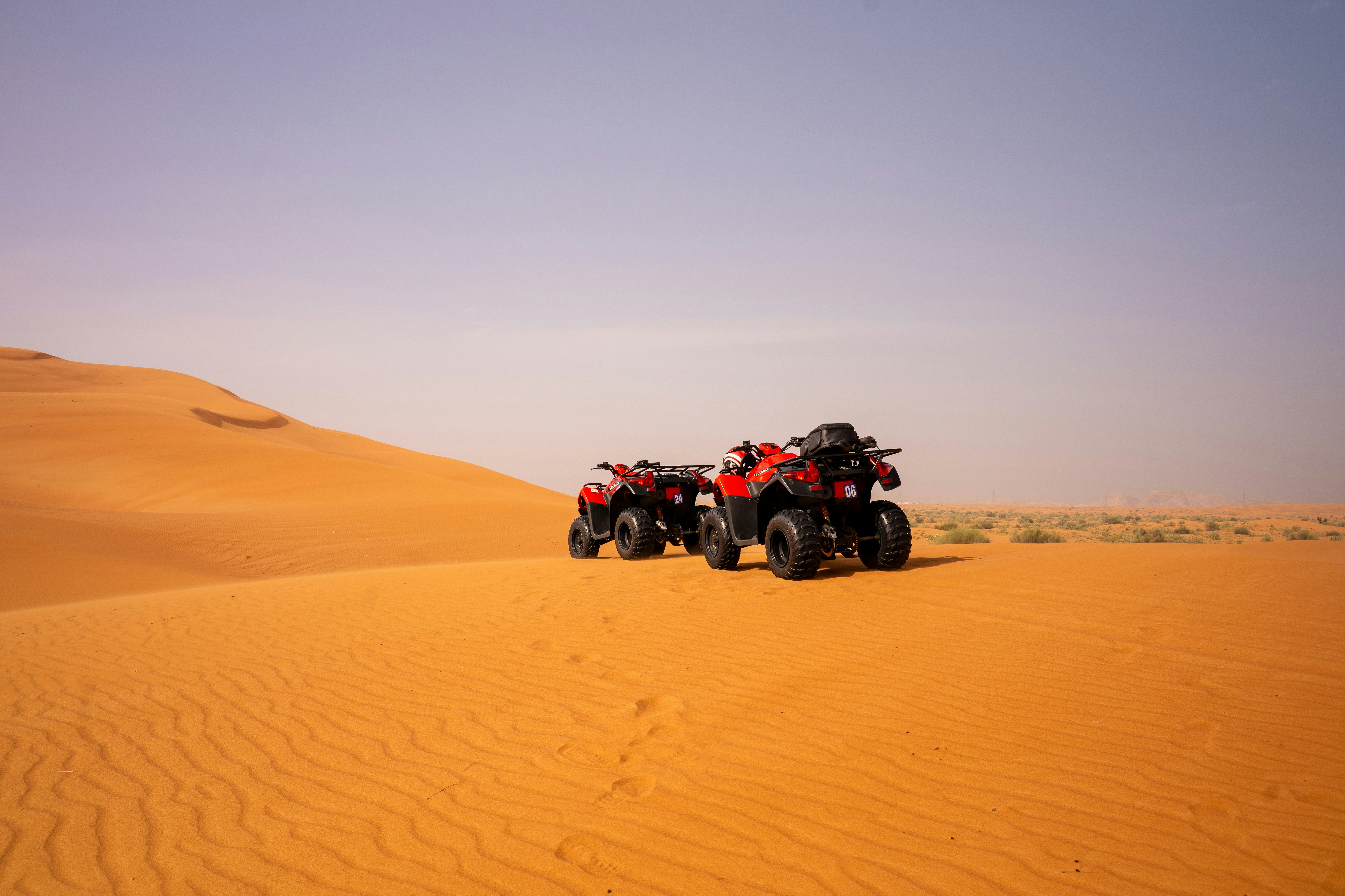 Red Quads on the Amber Dunes