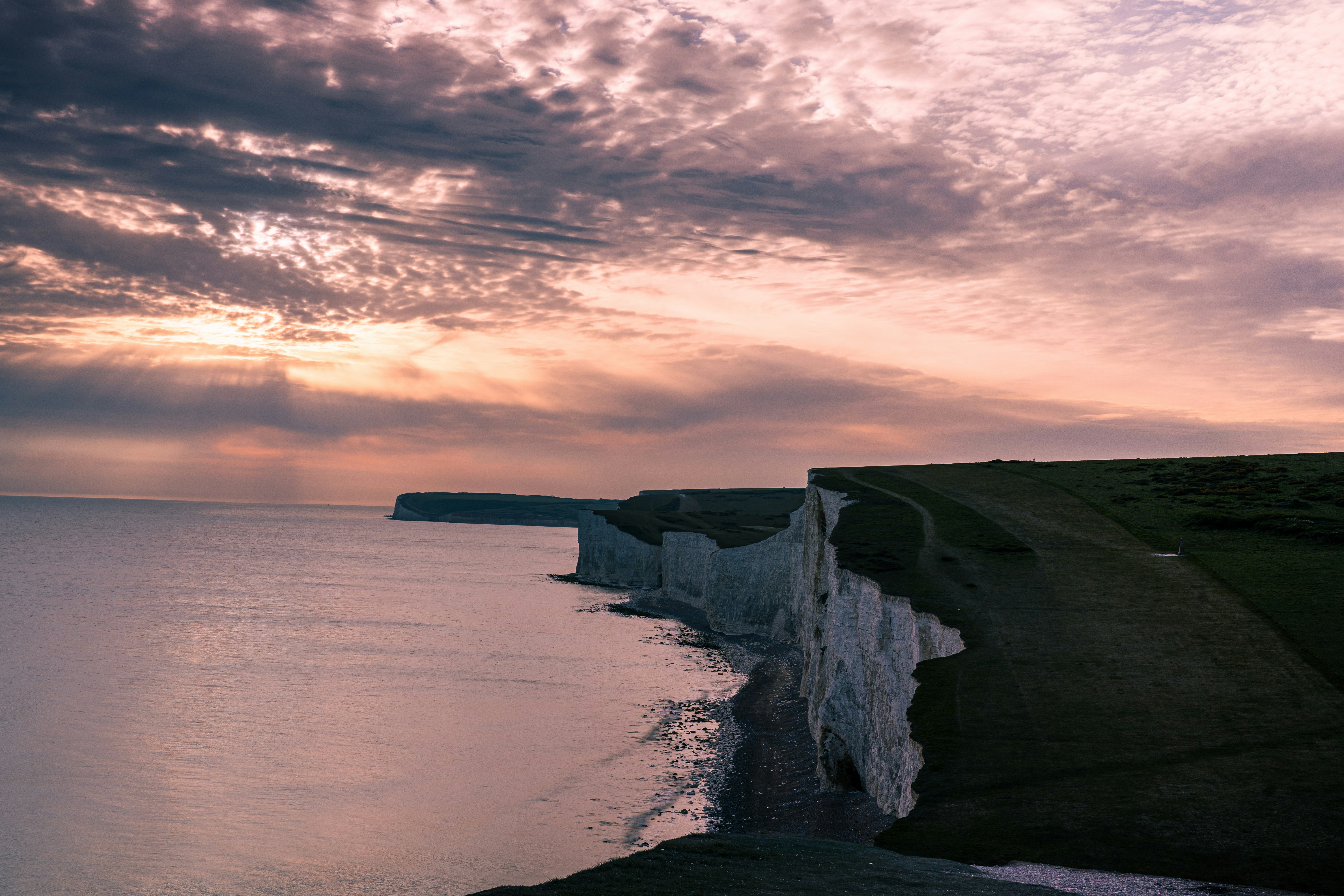 Cliffside Sunset: Sea Steps into Dusk
