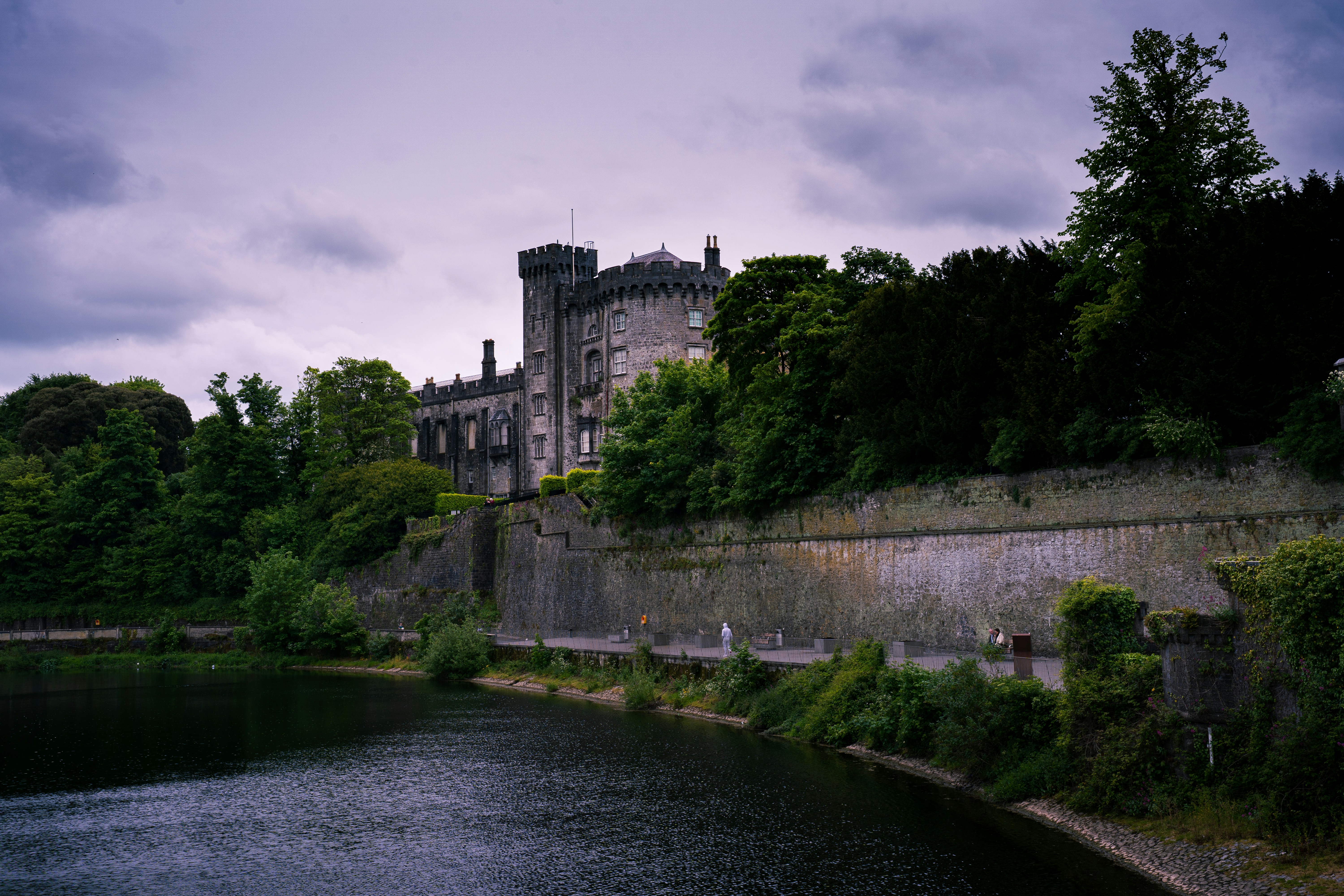 Castle on the Riverbank: A Tranquil Keep Above the Water