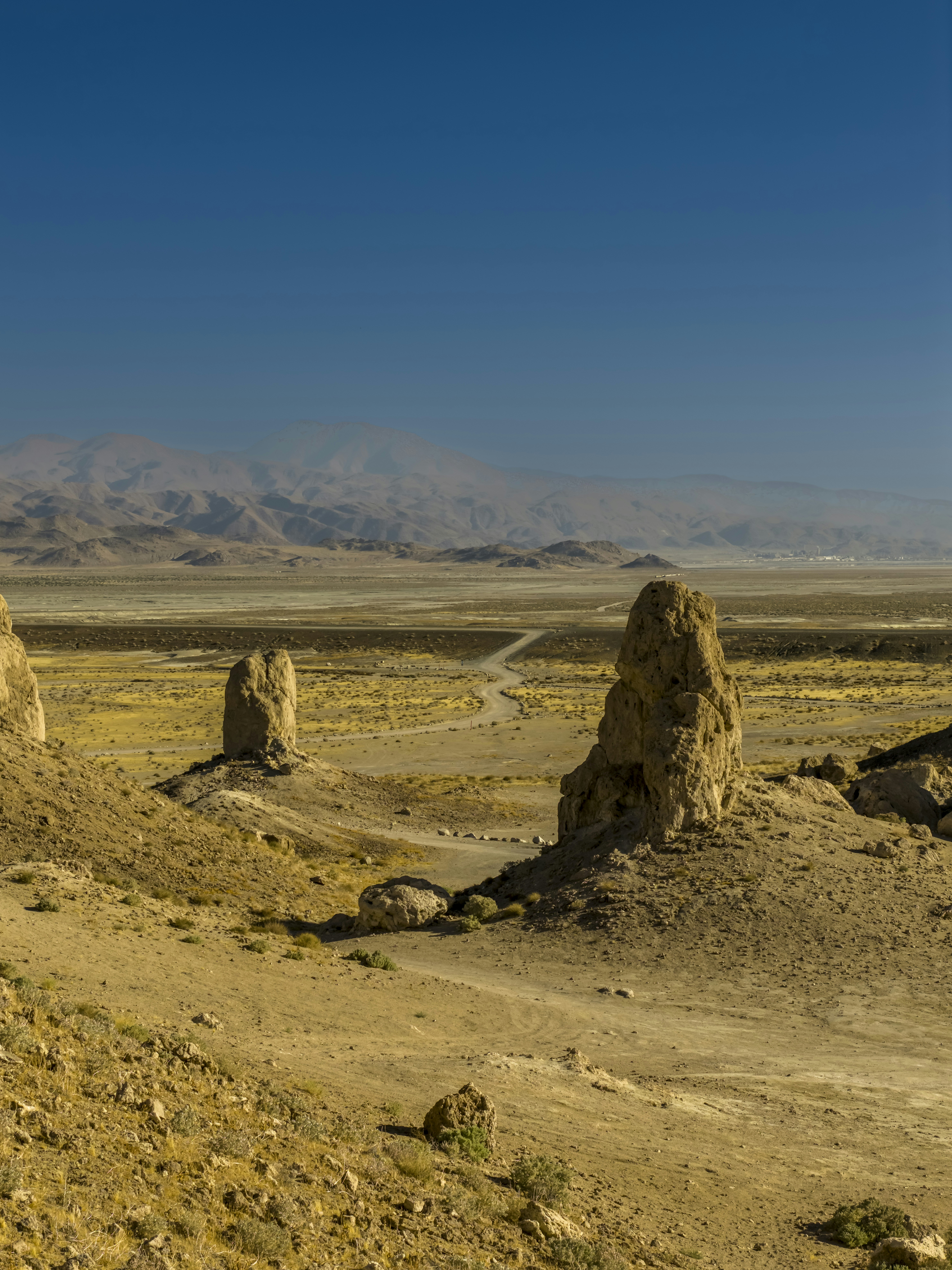 Desert Citadel: Tors of Eolian Sand Beneath a Clear Sky