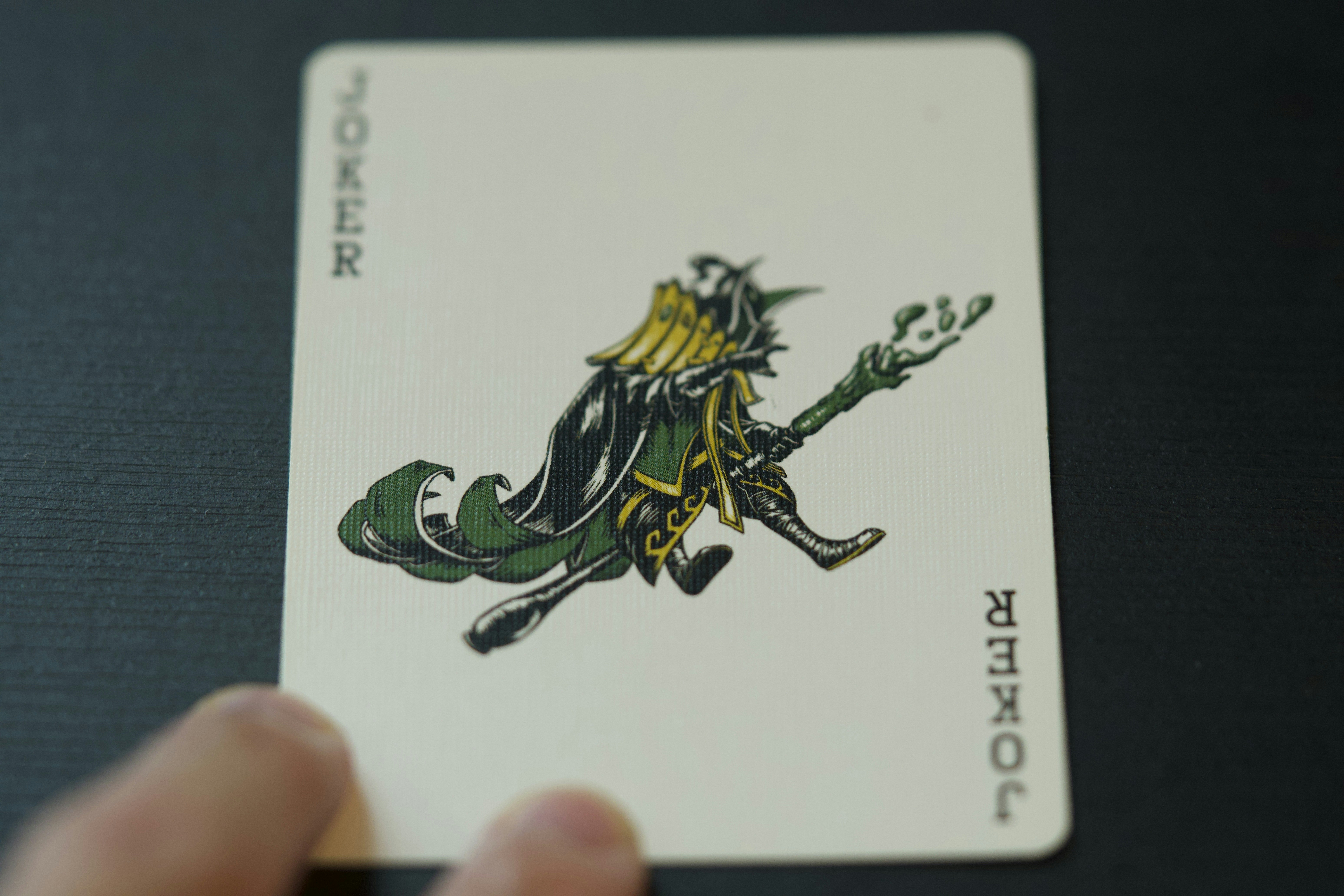 Knight of Spades in a Green Cape: A Card Portrait in Focus