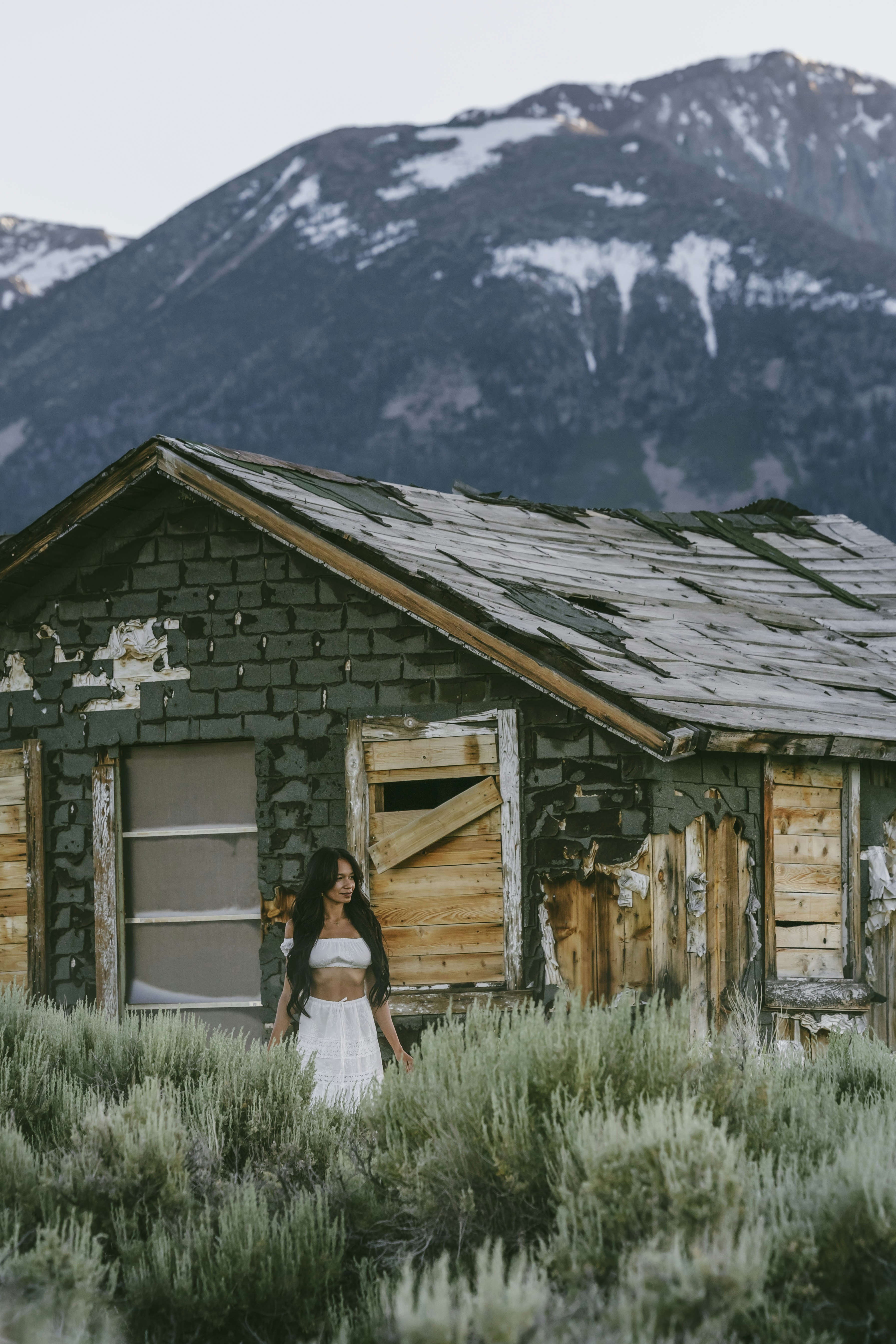 Lingering Portrait Before a Weathered Barn in Alpine Heather