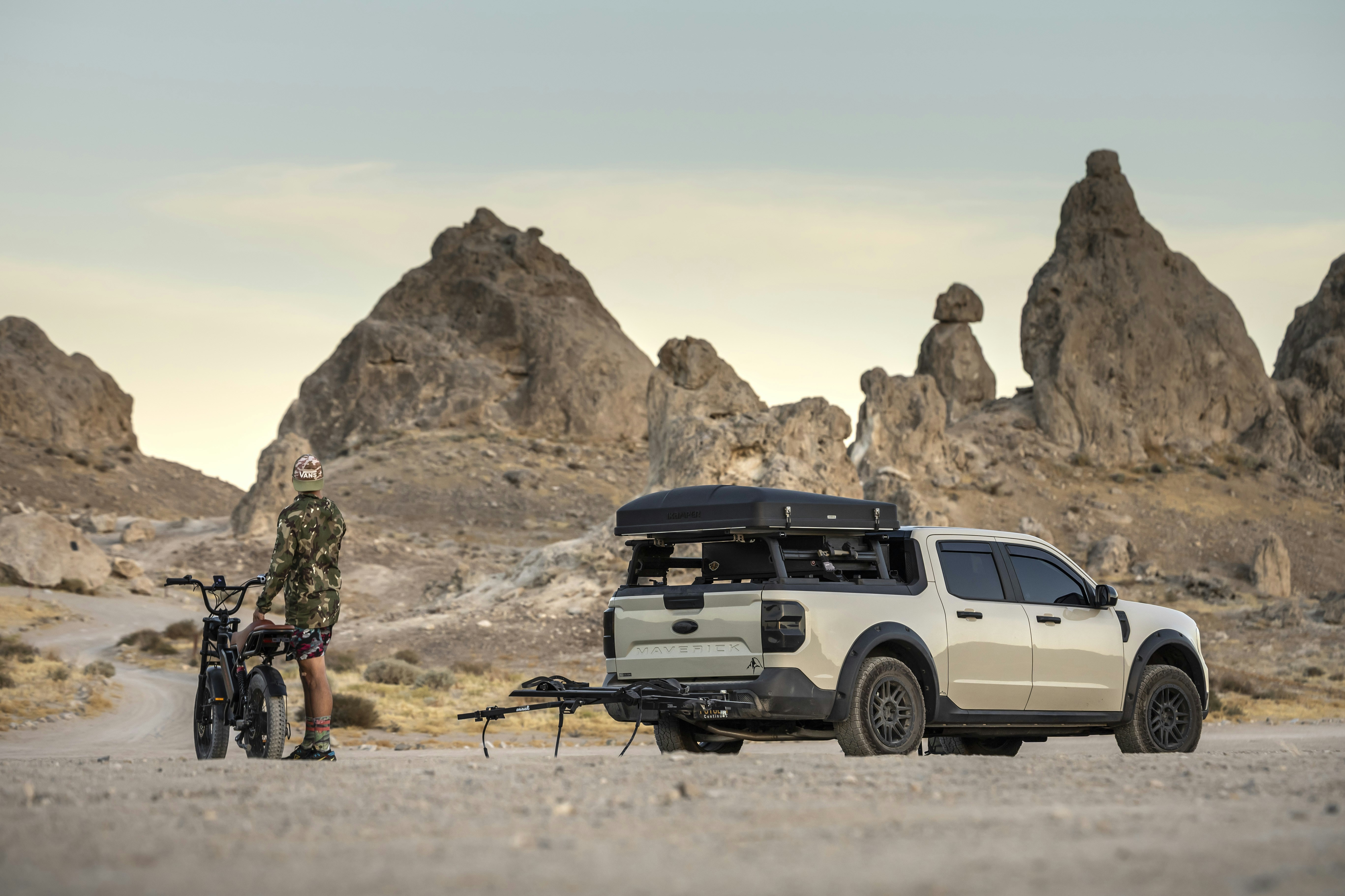 Trailbound: A Camper, E-bike, and Truck Amid Desert Needle Monuments