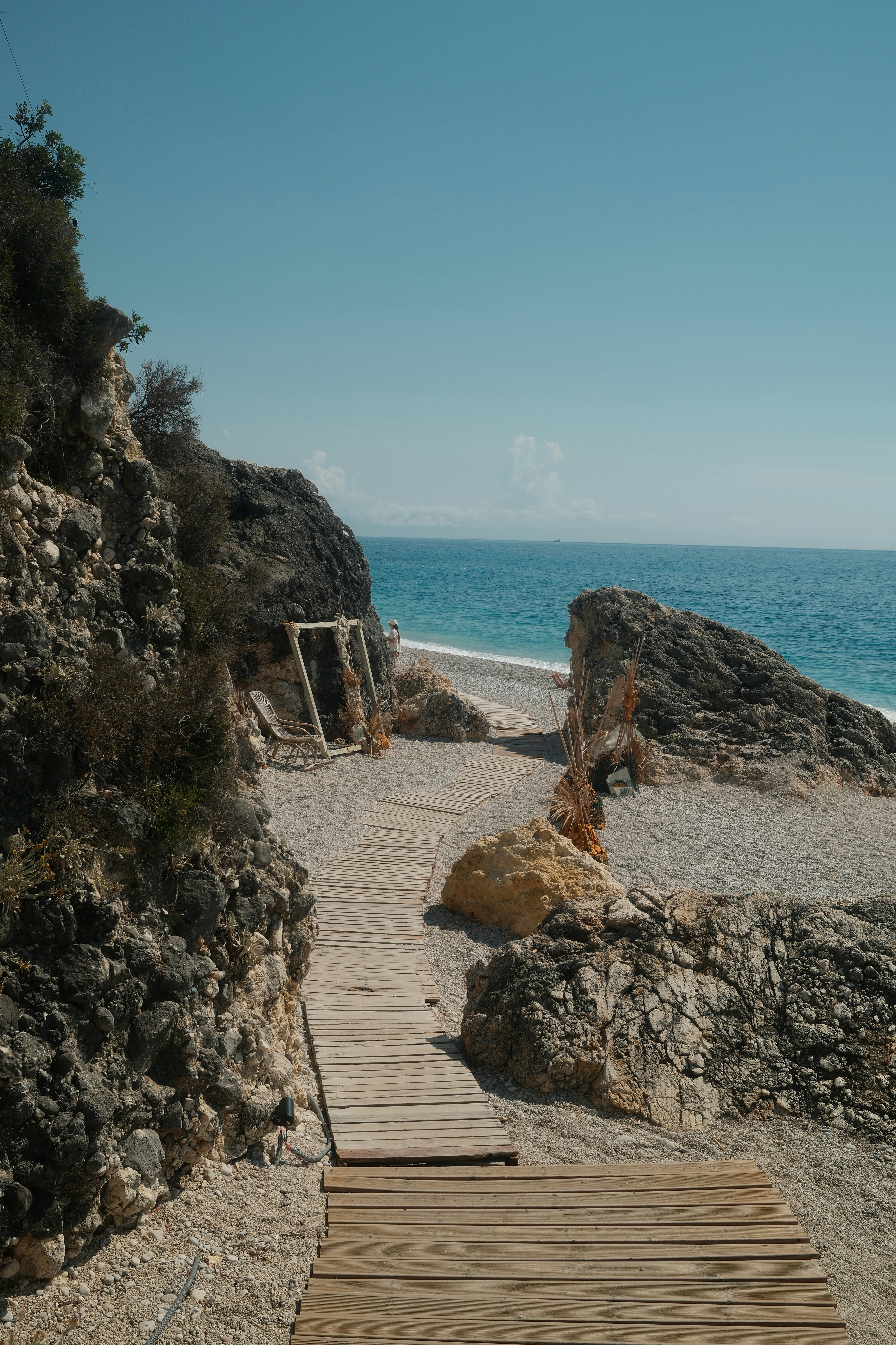 Wooden Boardwalk Weaving Toward the Sea