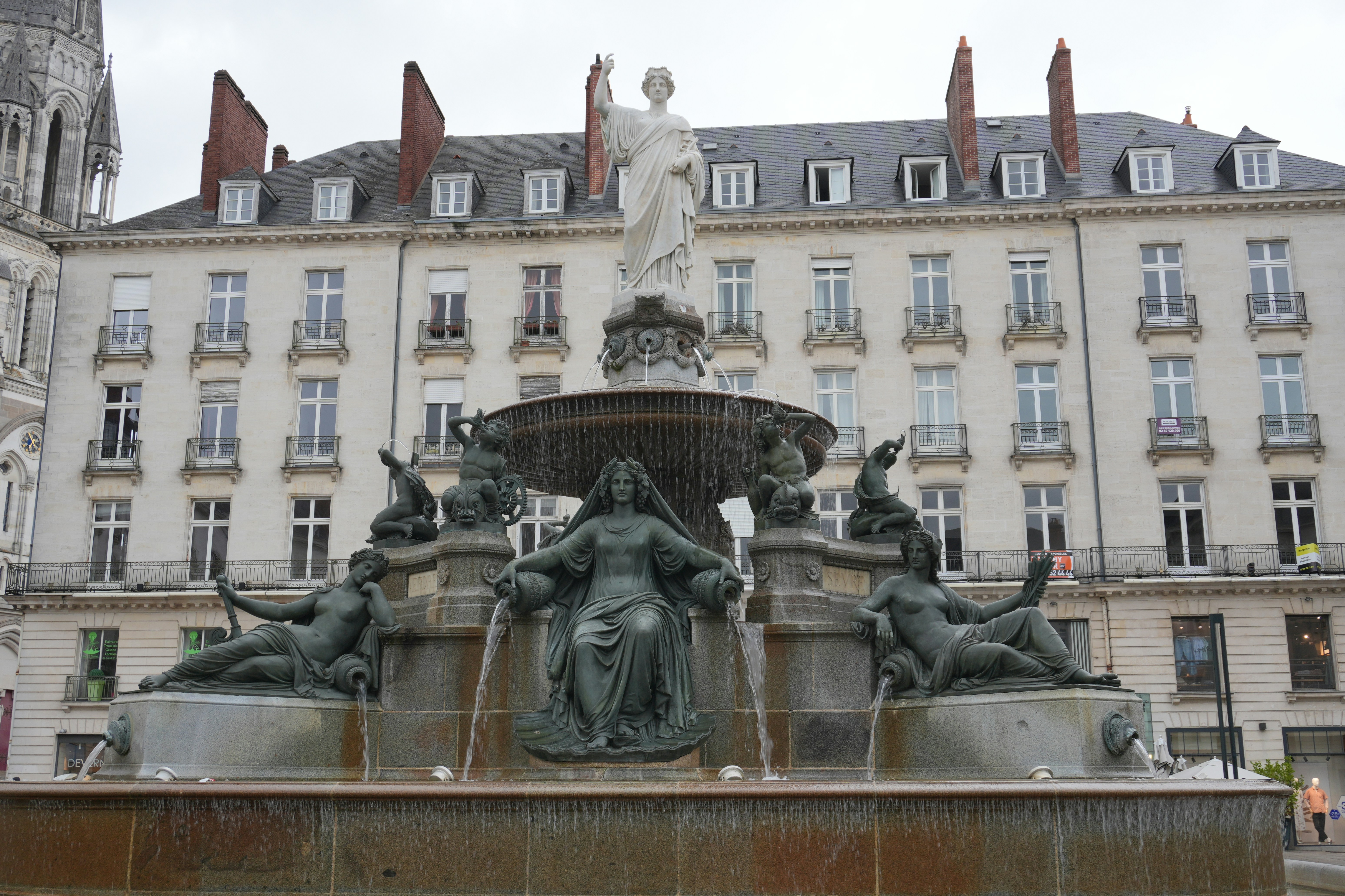 Central Fountain of Sculpted Allegory in a European Square