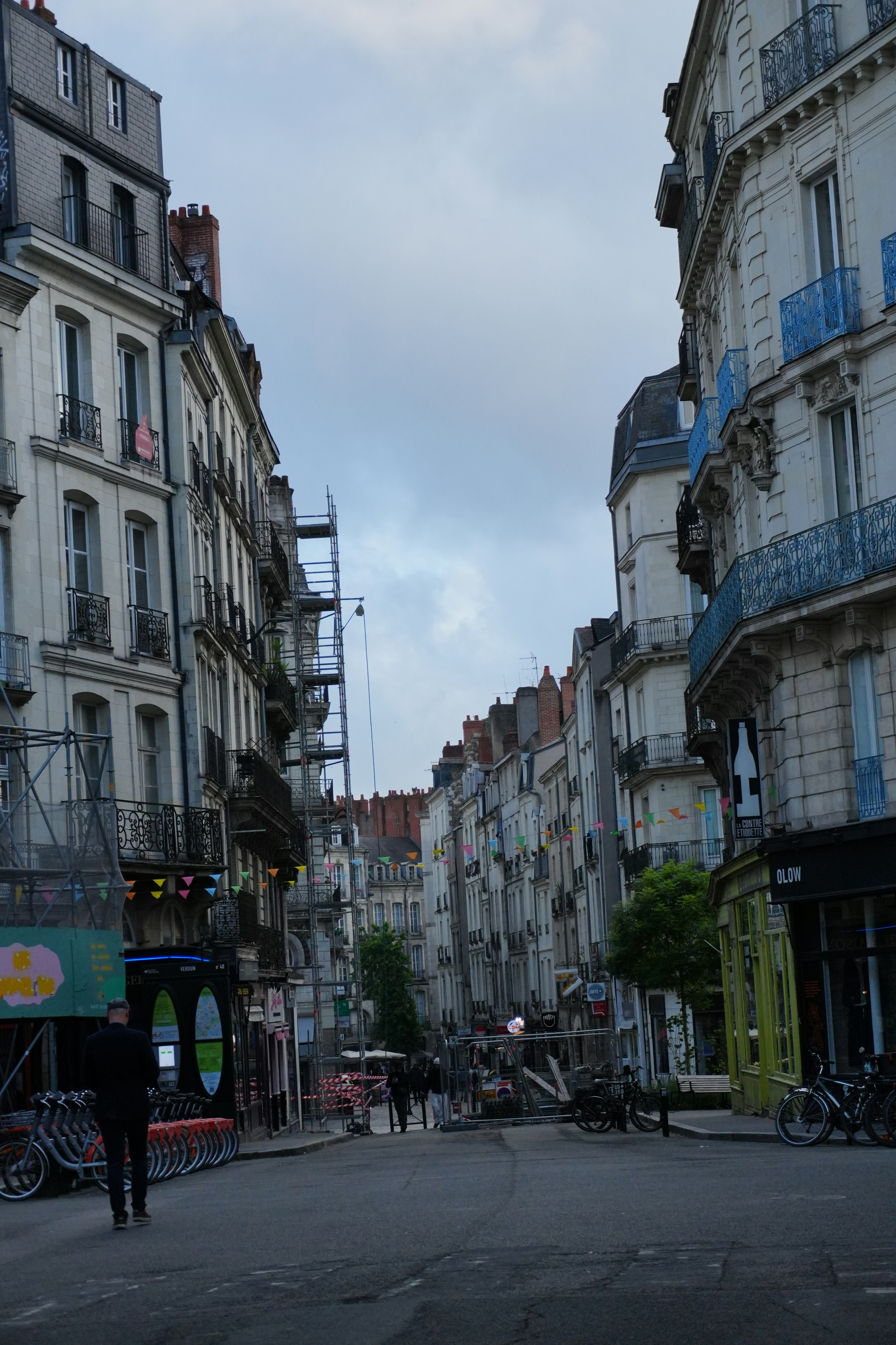 Cobbled Street Between Facades: A Quiet Day in a European Quarter