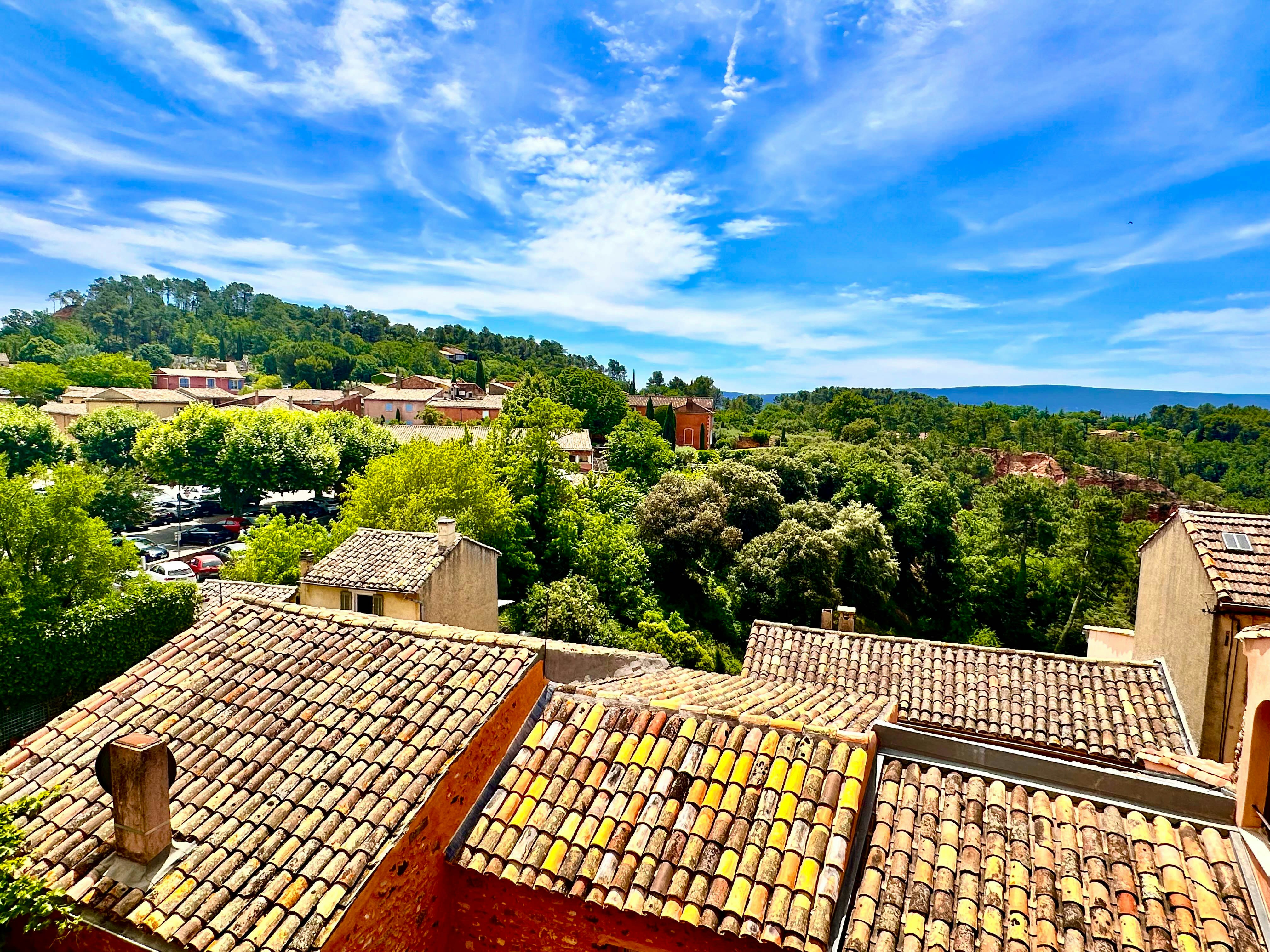Terracotta Roofscape Under a Vivid Sky