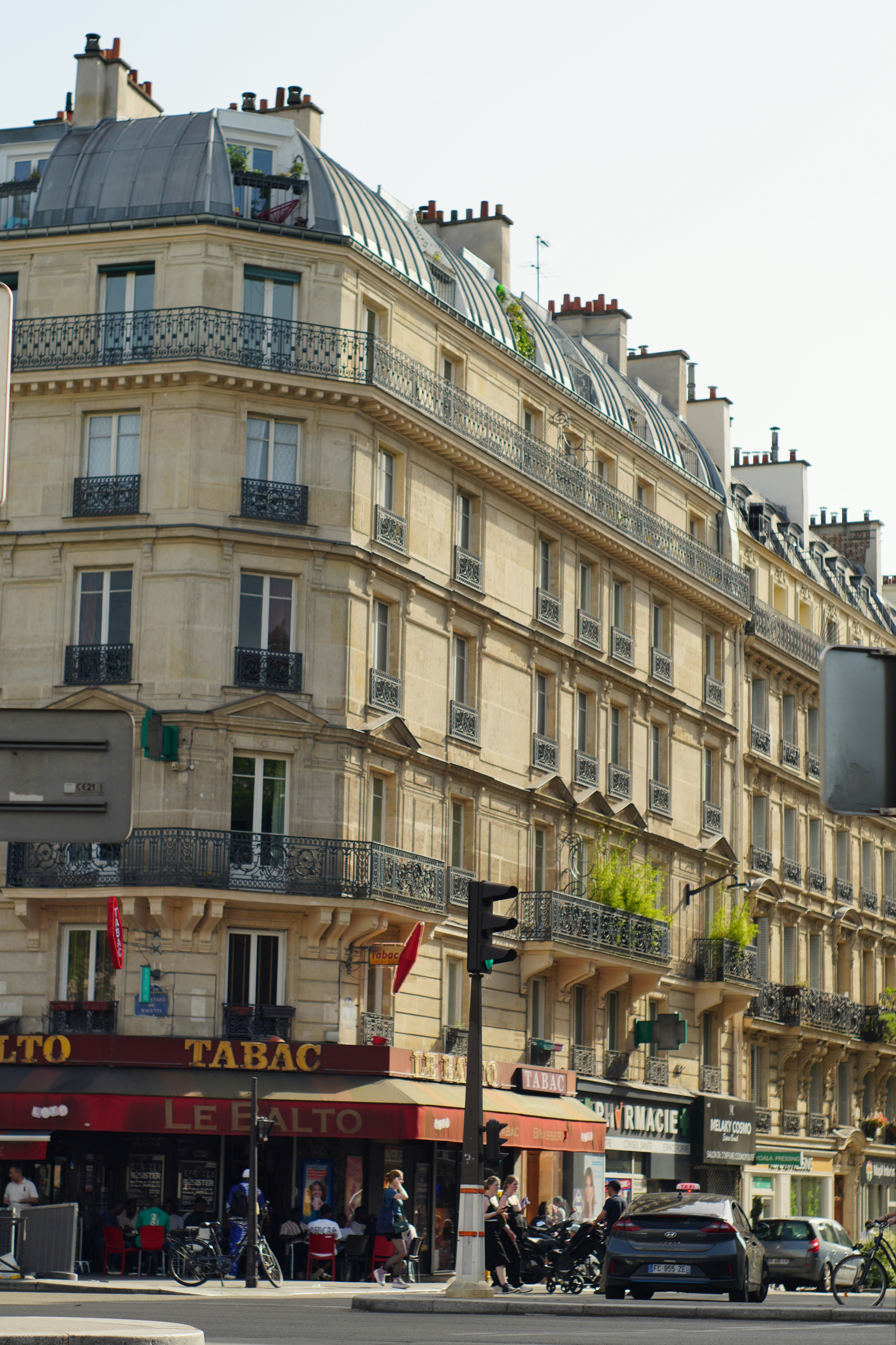 Parisian Corner: Facades, Cafés, and a Busy Street