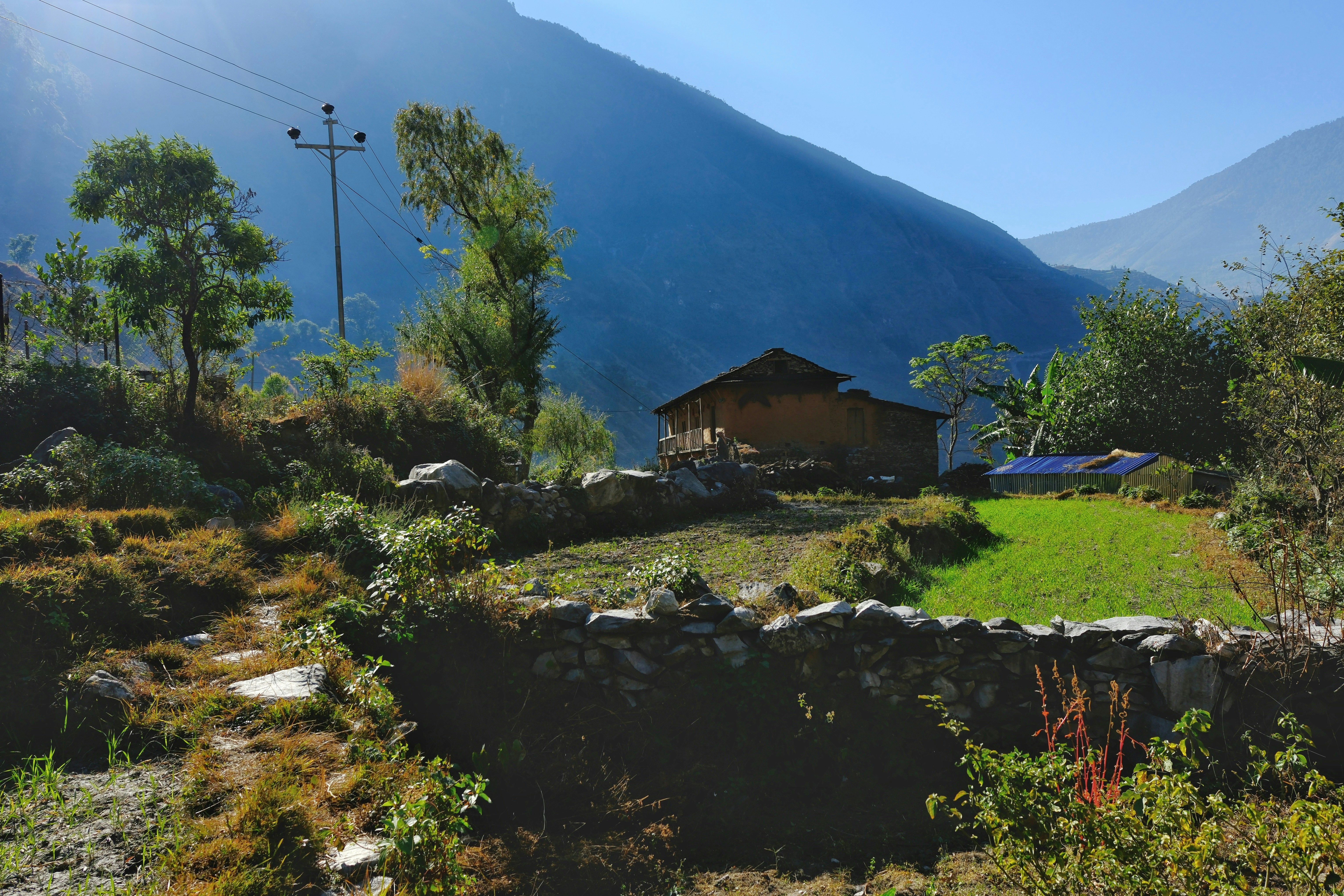 Stone Cottage Beneath Alpine Peaks