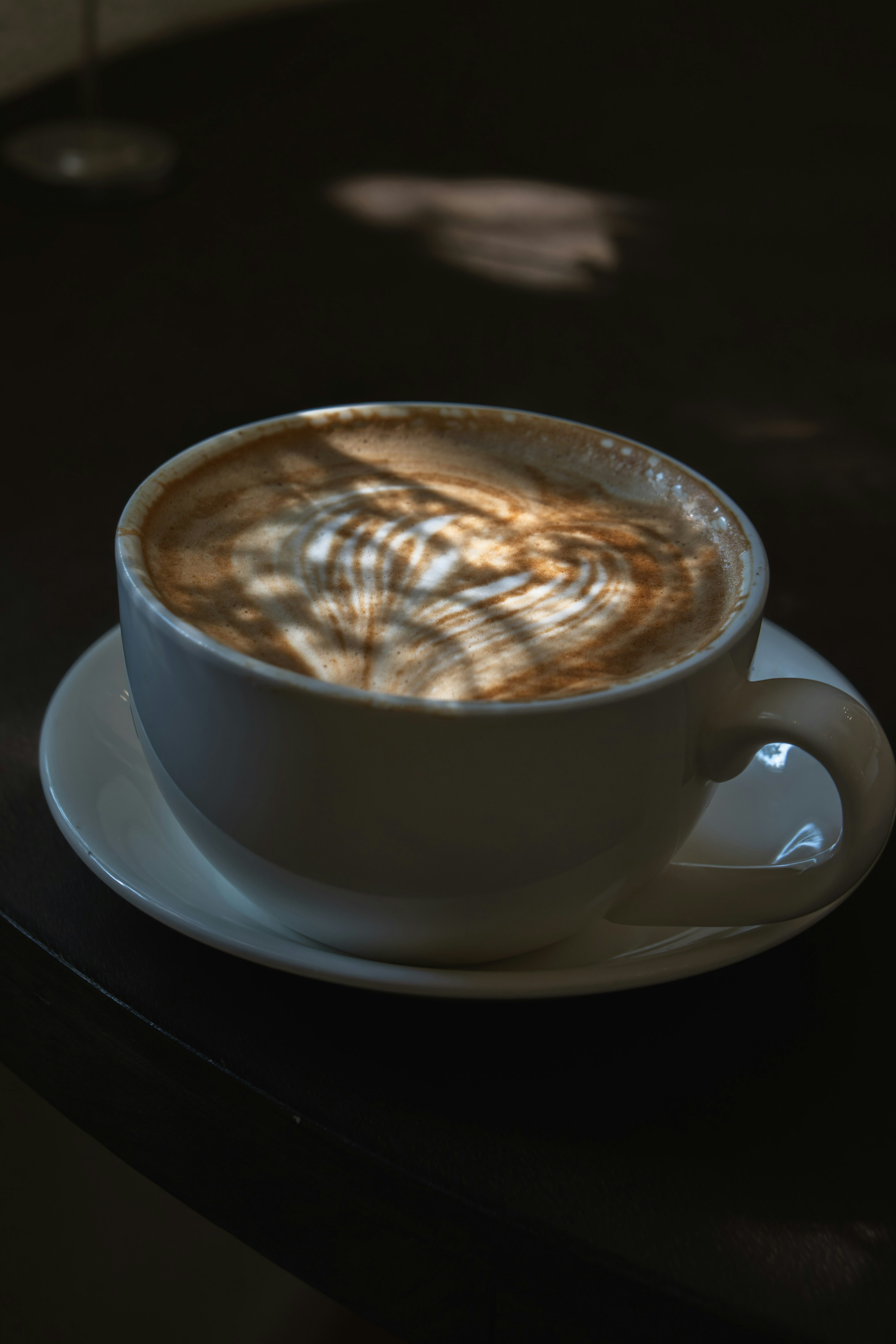 Swirl of Aroma: Latte Art in Soft Morning Light