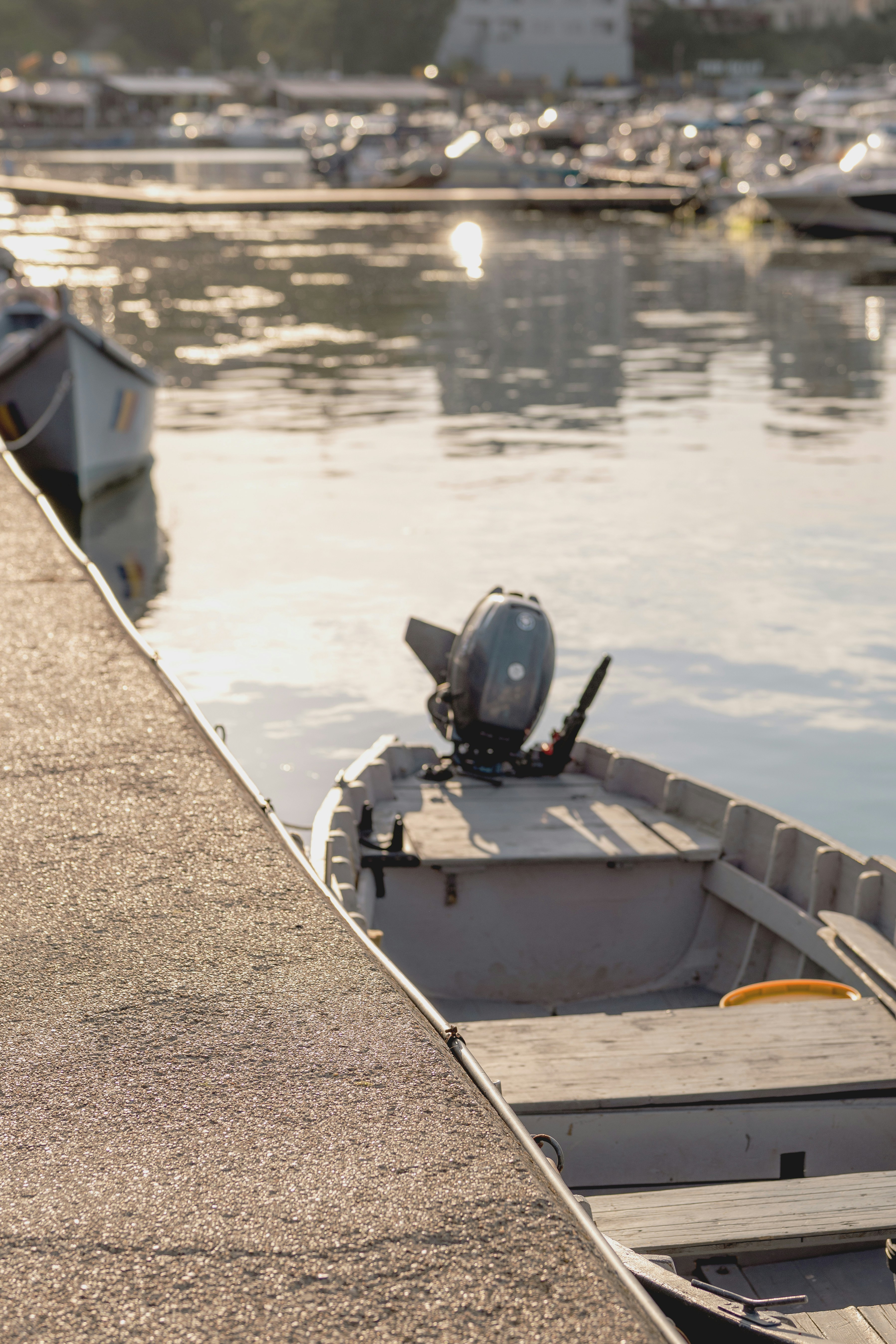 Harbor Spotlight: Boat Engine and Docks in Soft Evening Light