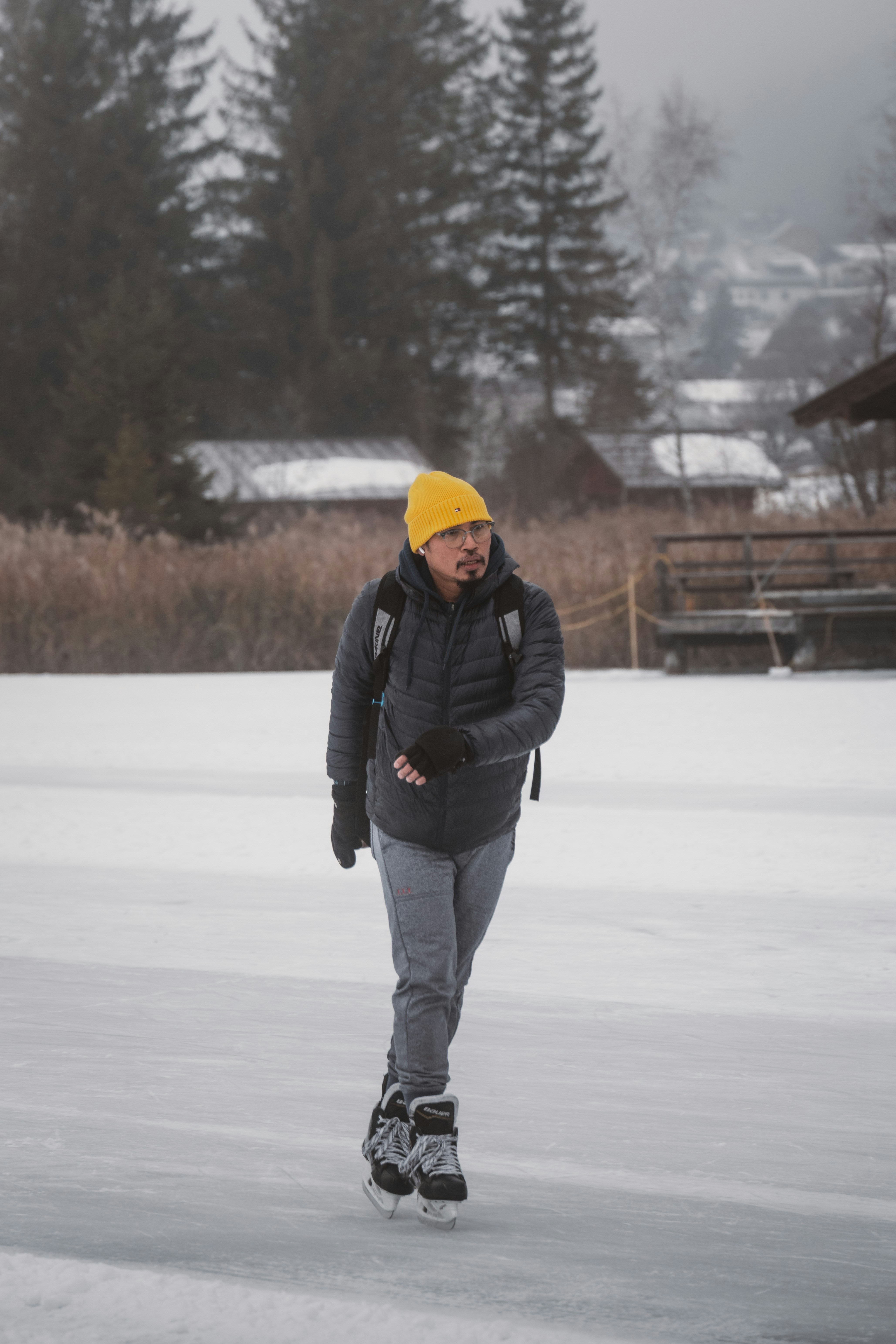 Yellow-hatted Wanderer on a Quiet Winter Lake
