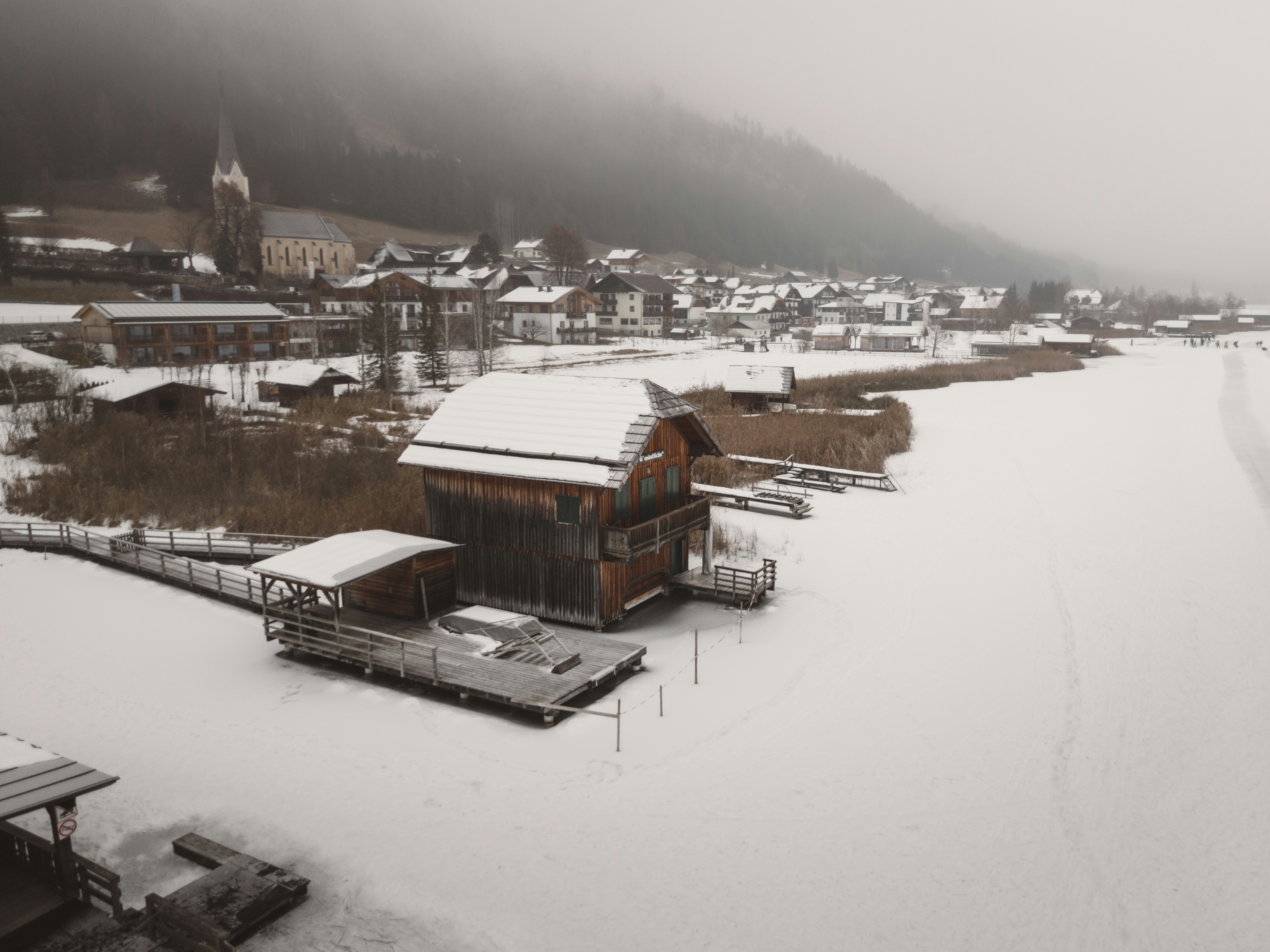 Snowbound Boathouse Retreat Overlooking a Quiet Alpine Village