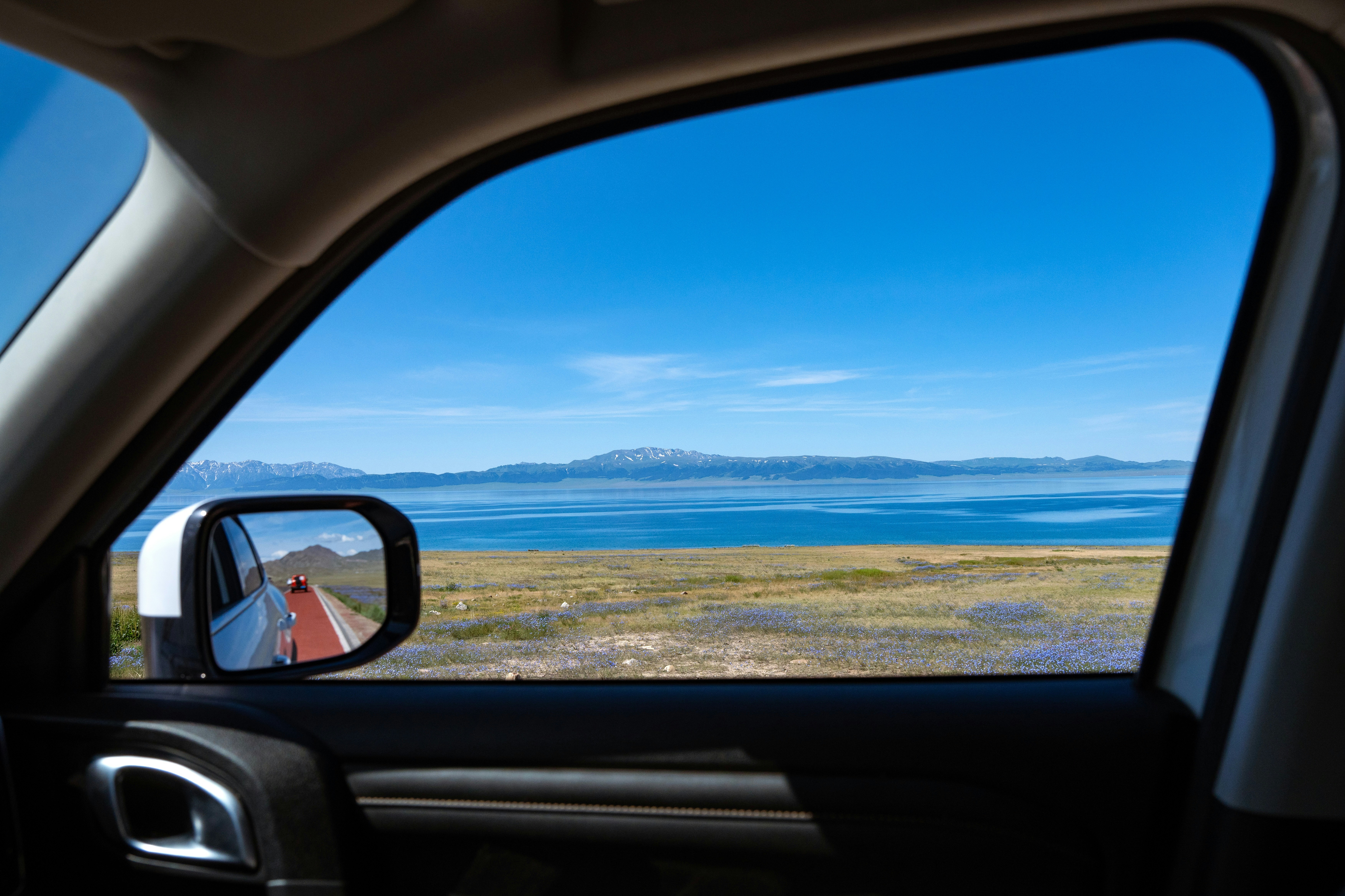 Window Seat Overlook: Ocean Horizon Beyond the Car Window