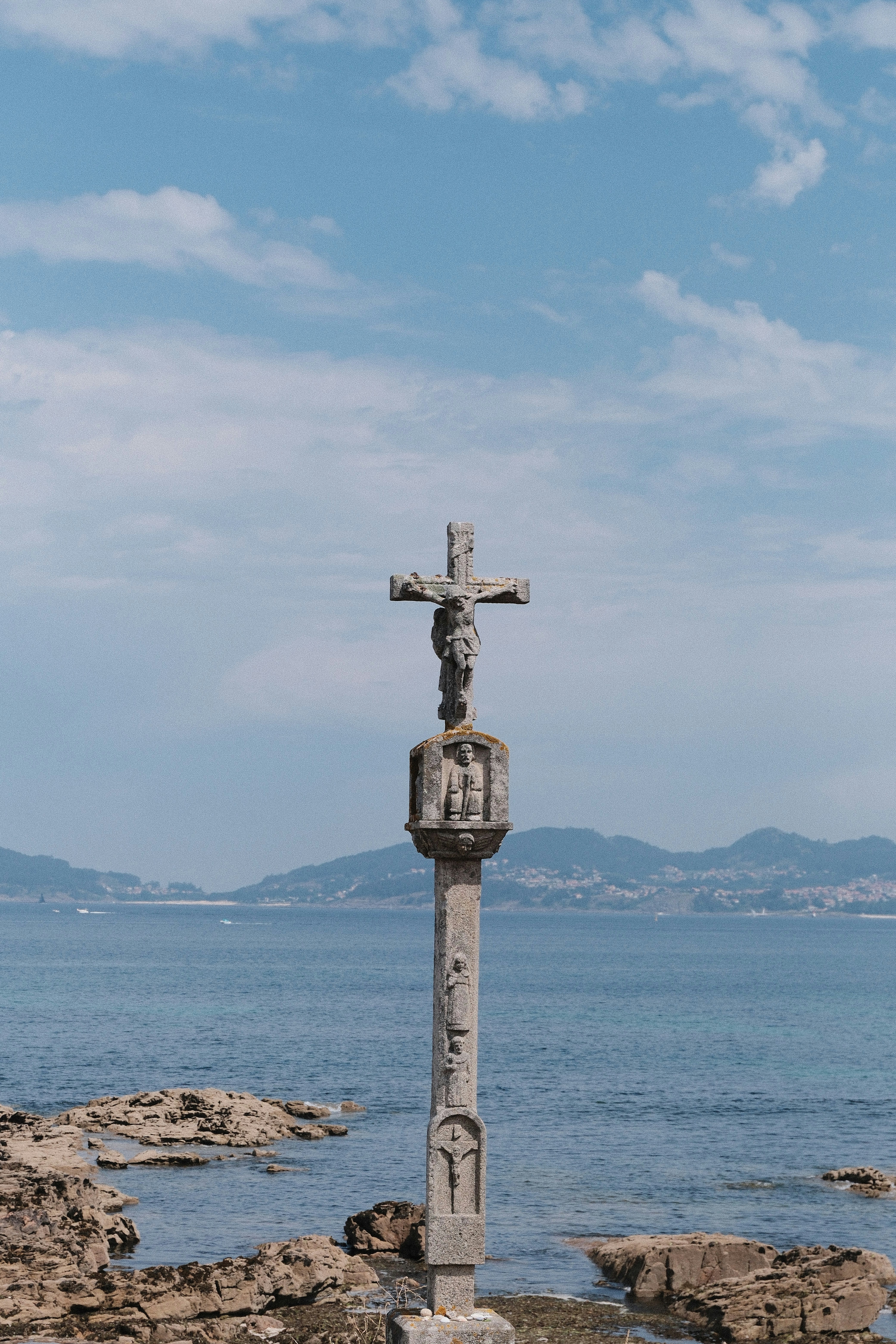 Stone Cross Rising Over Calm Adriatic
