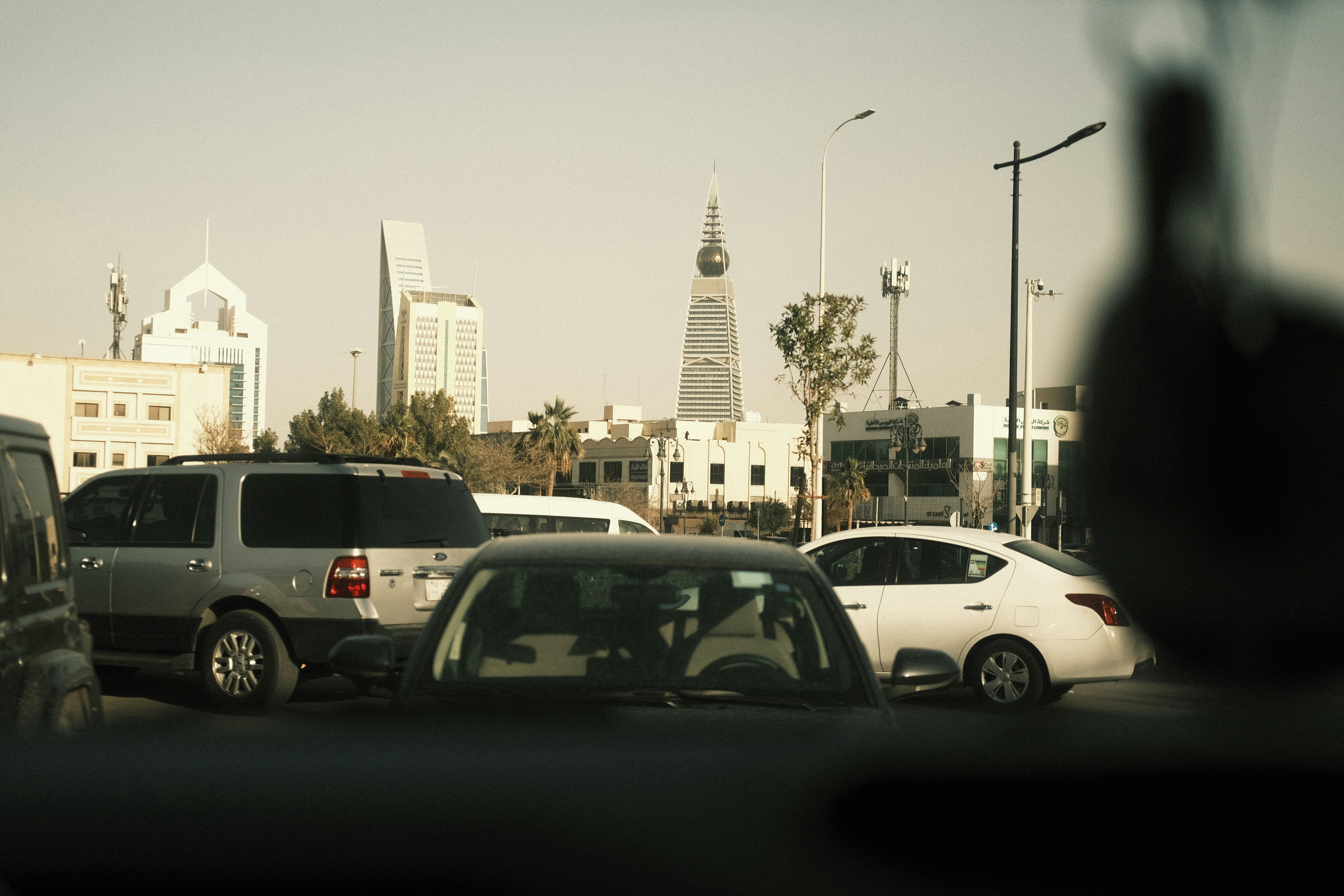 Line of Cars Toward a Distant Skyline
