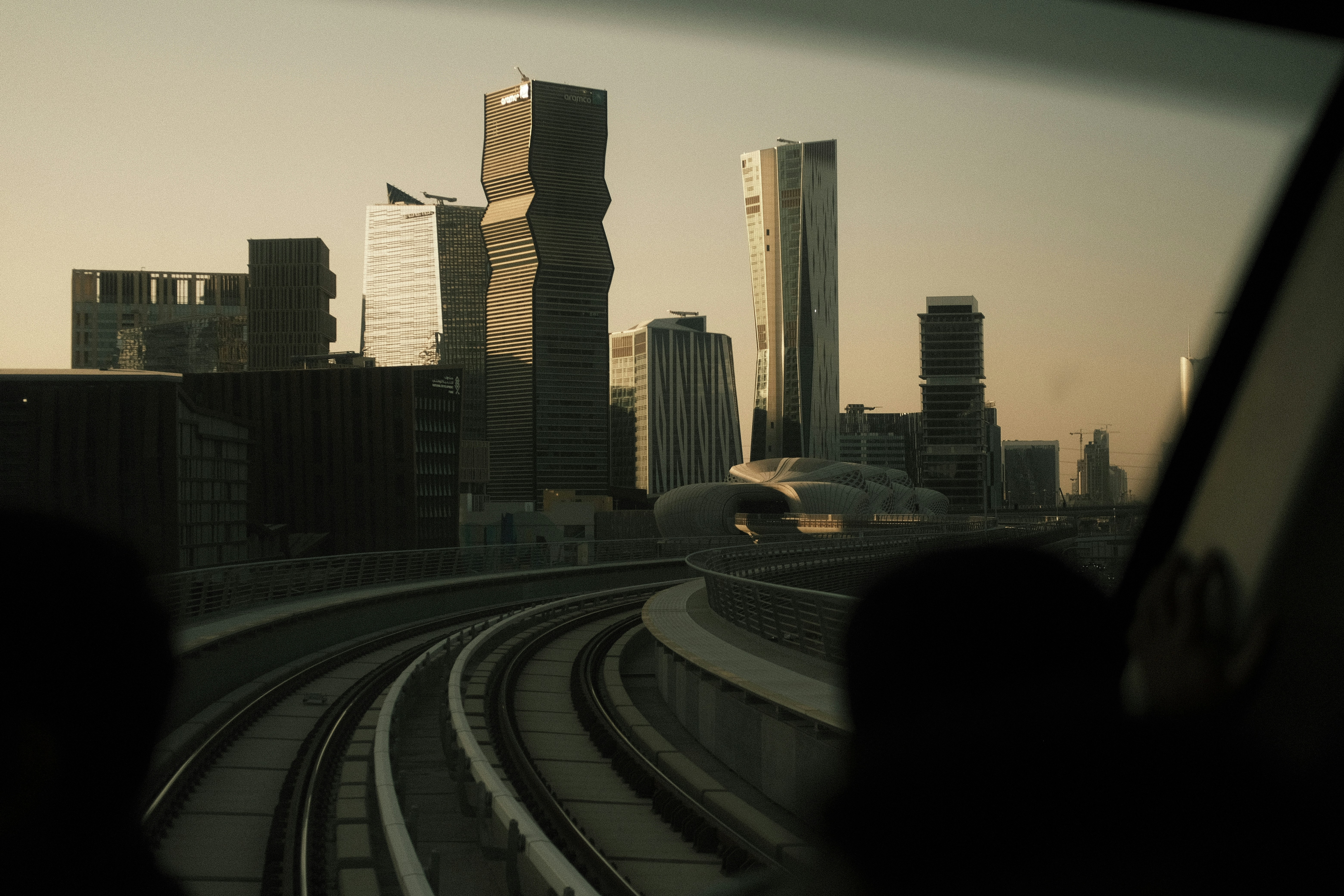 Cityscape on Rails: Dawn Over a Modern Skyline