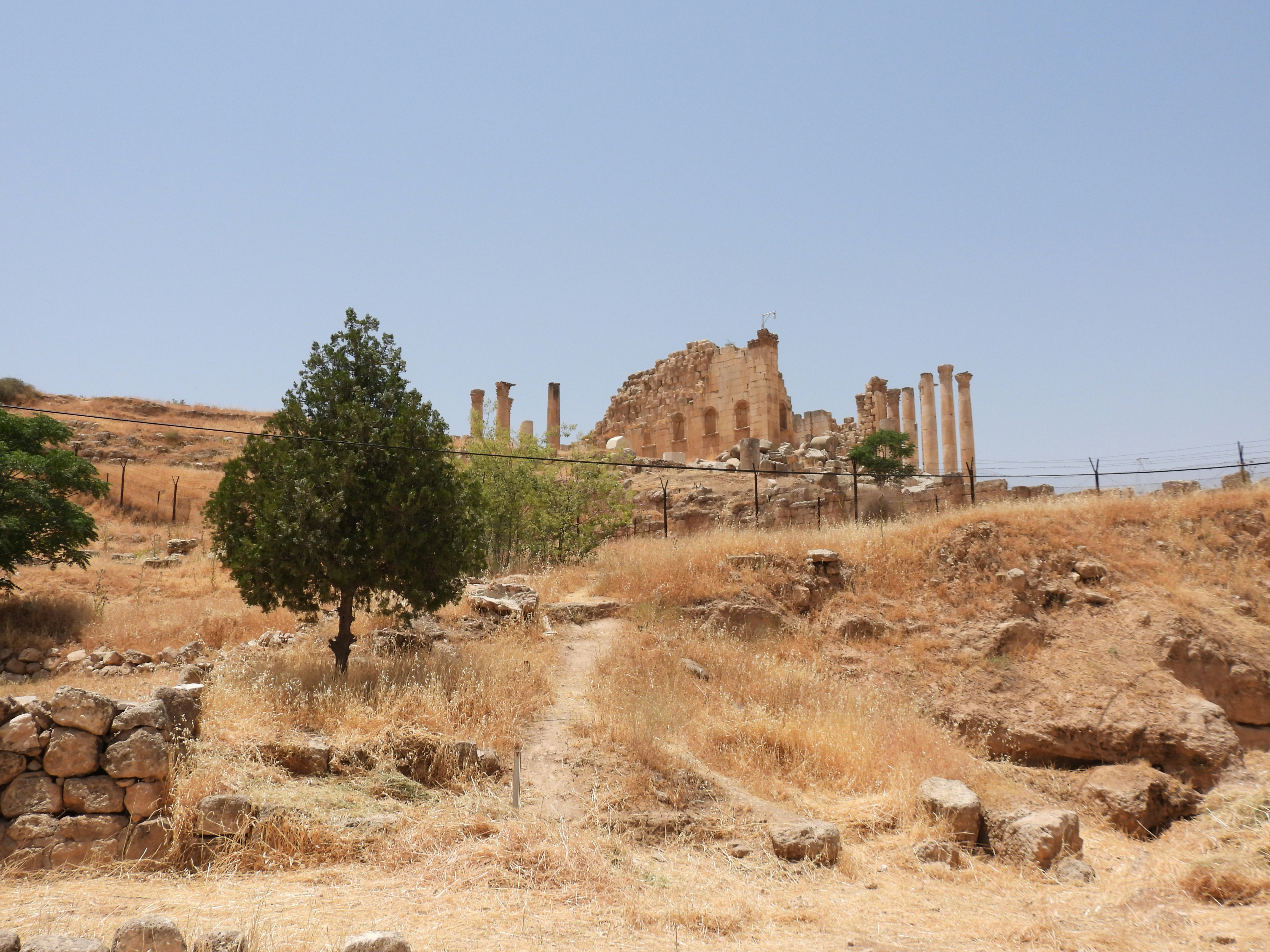 Ruins on the Hill: A Dry Landscape with Ancient Columns