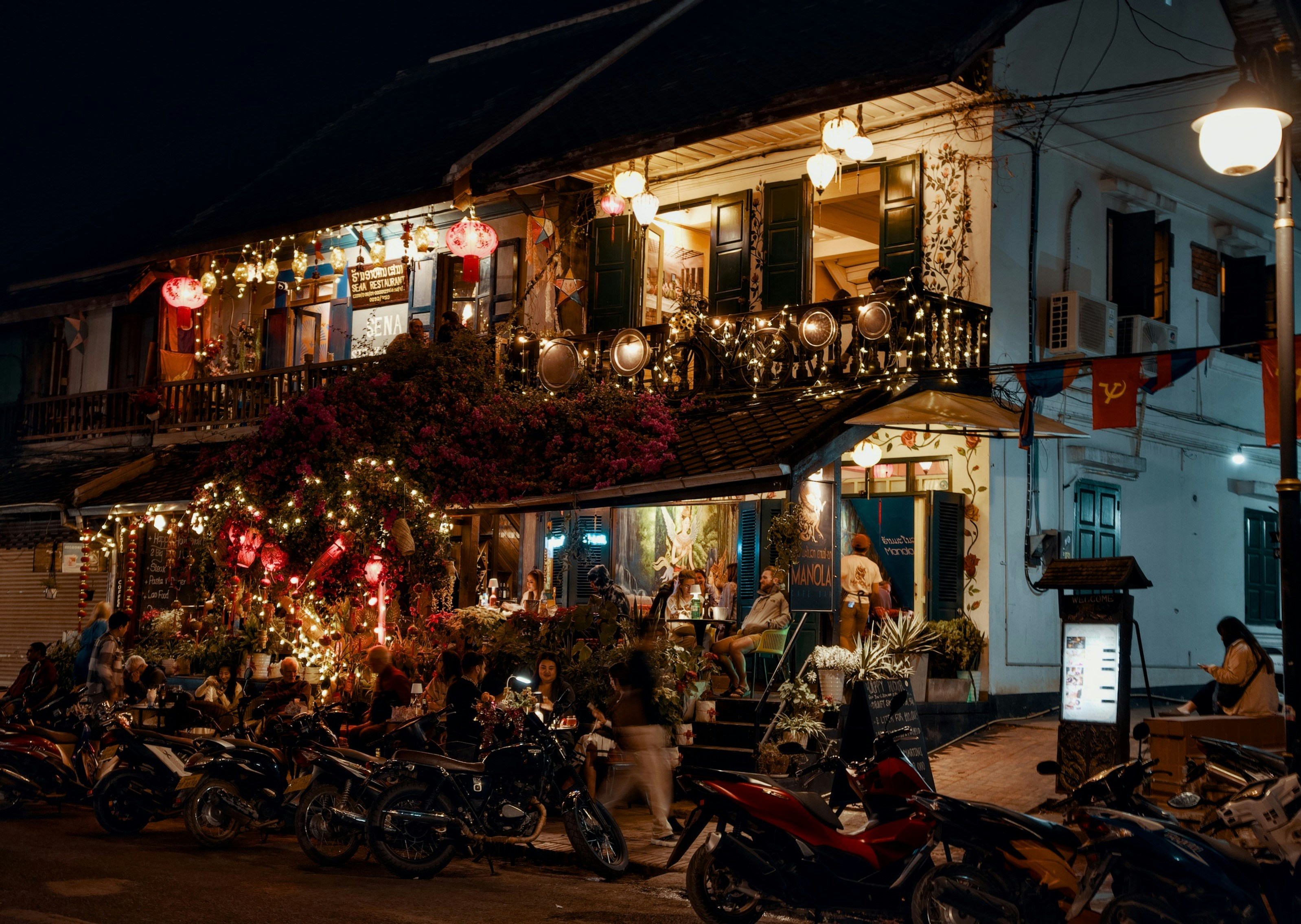 Lantern-lit Bistro on a Bustling Night Street