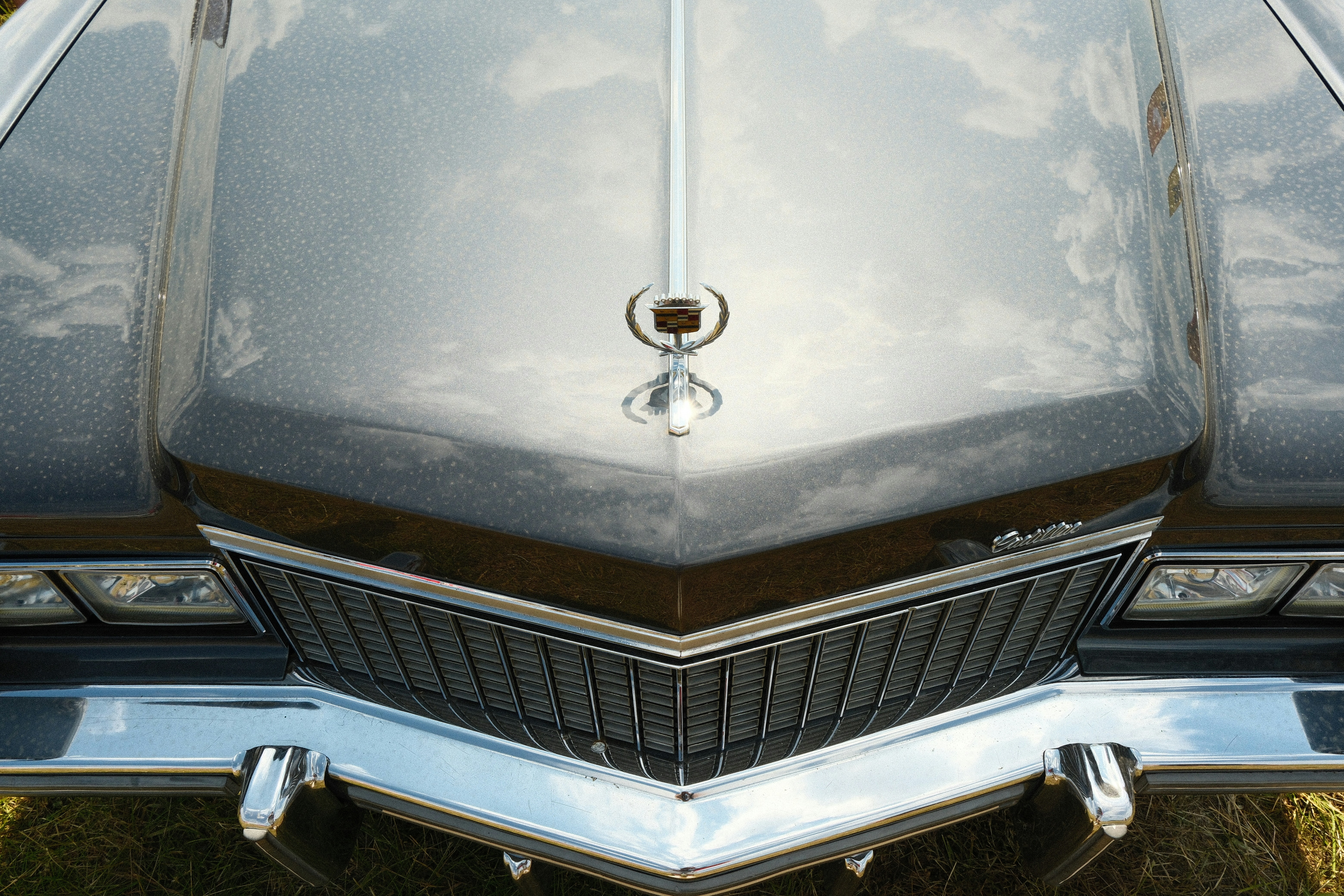 Chrome Grille Reverie: A Classic Car's Front Face from Above