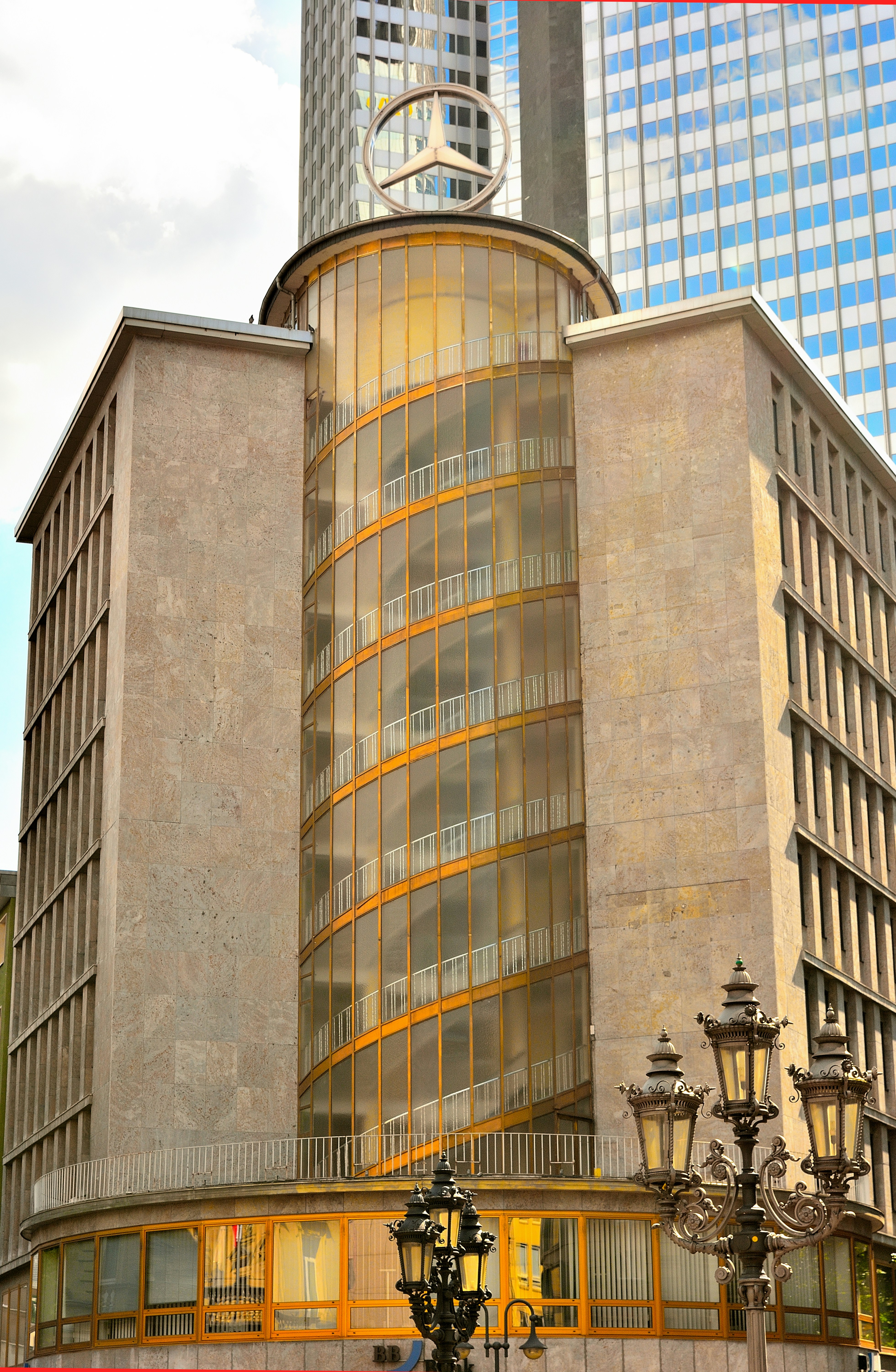The Spired Circle: A City Center Tower Framed by Antique Lamps