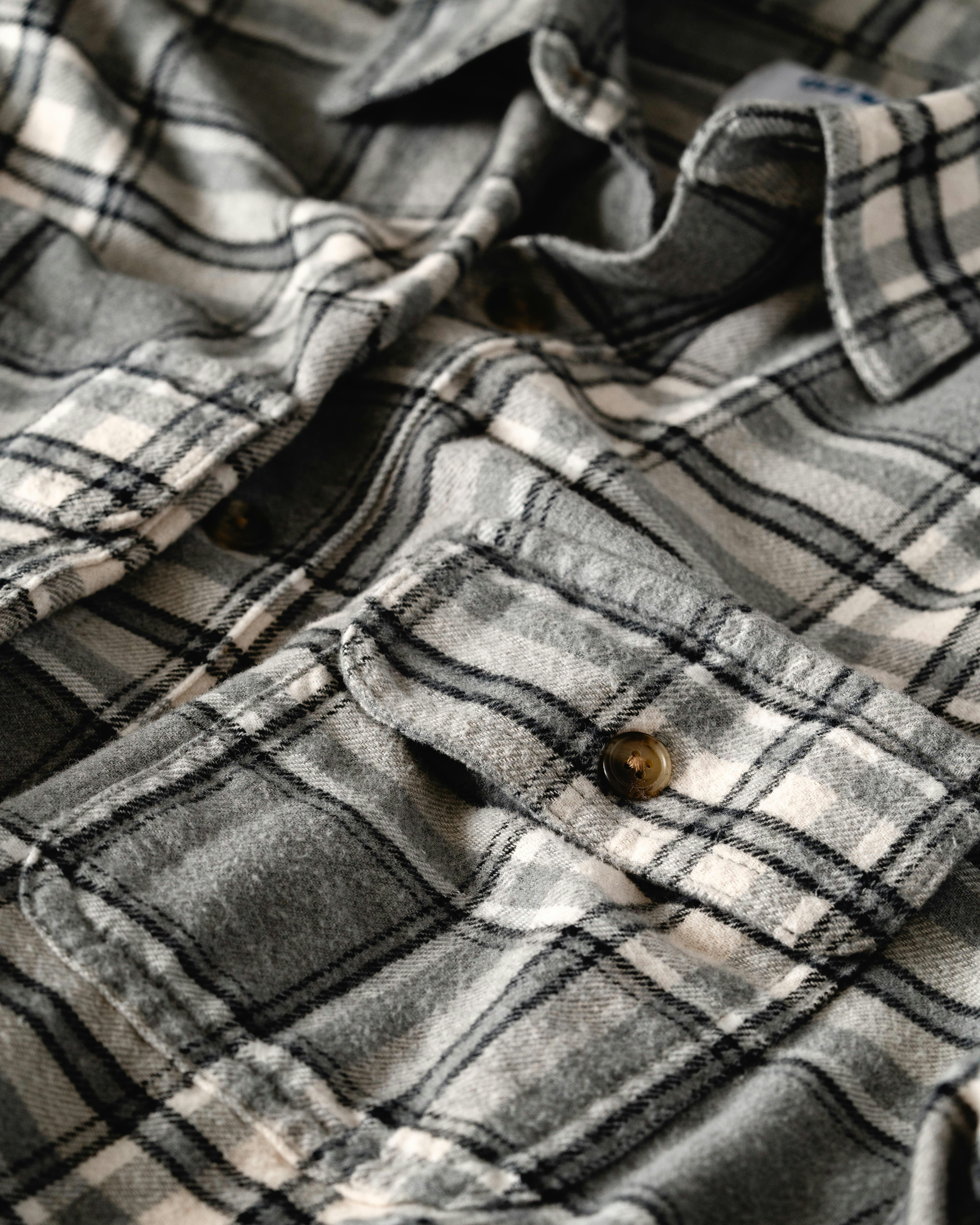 Plaid Fabric Fold: Quiet Portrait of Texture and Light