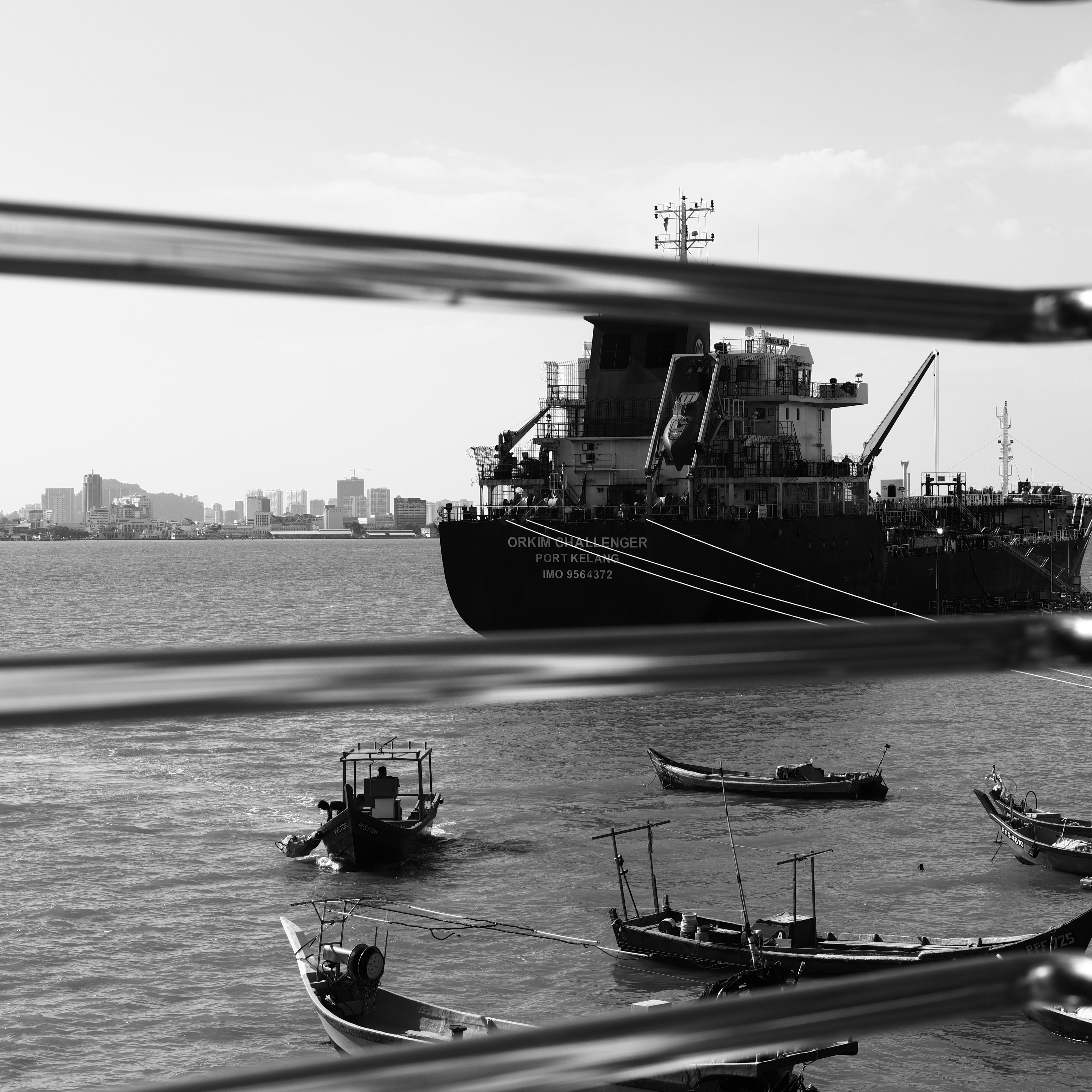 Harbor Tranquility Framed by Railing Lines