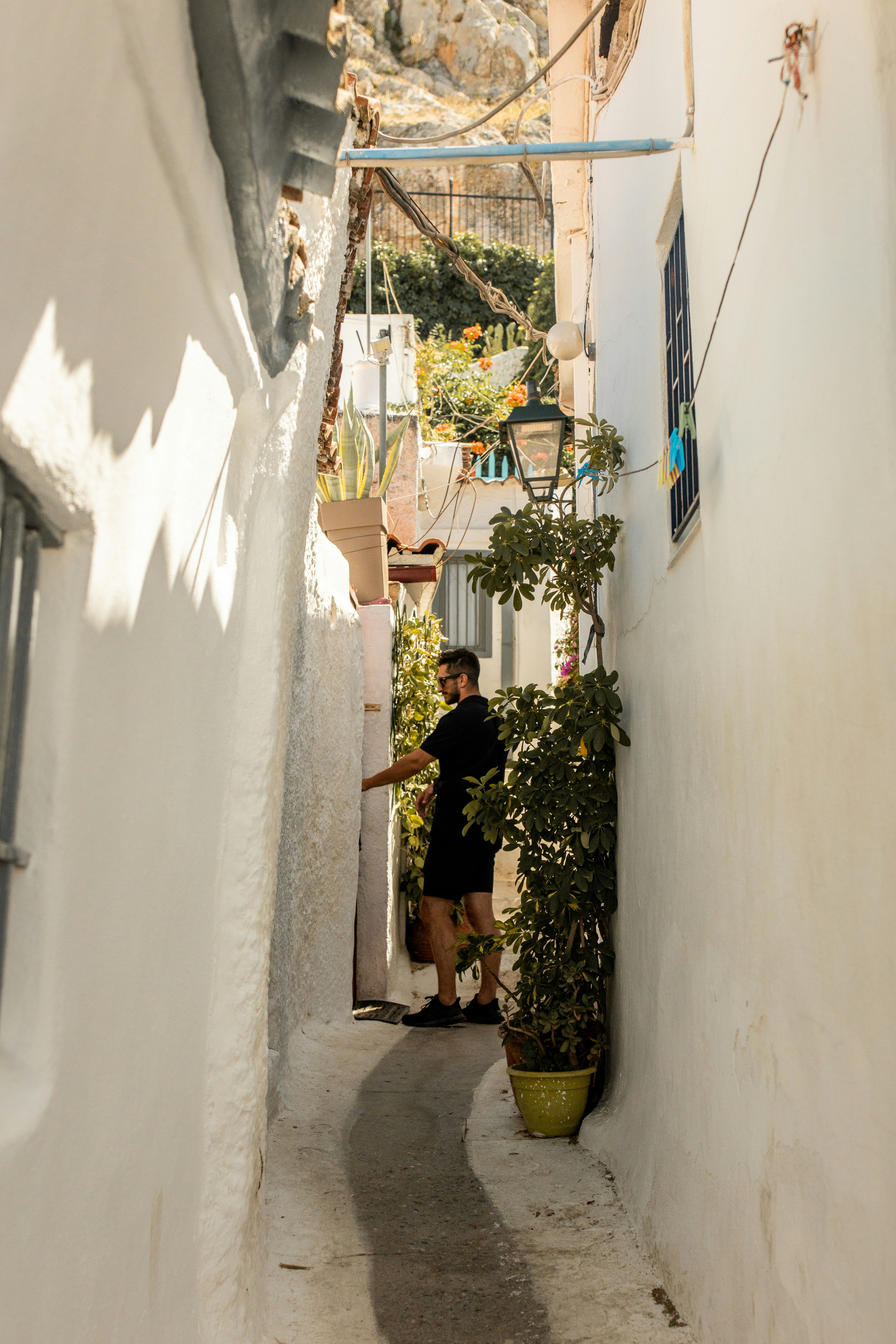 Narrow Sunlit Alleyway Encounter