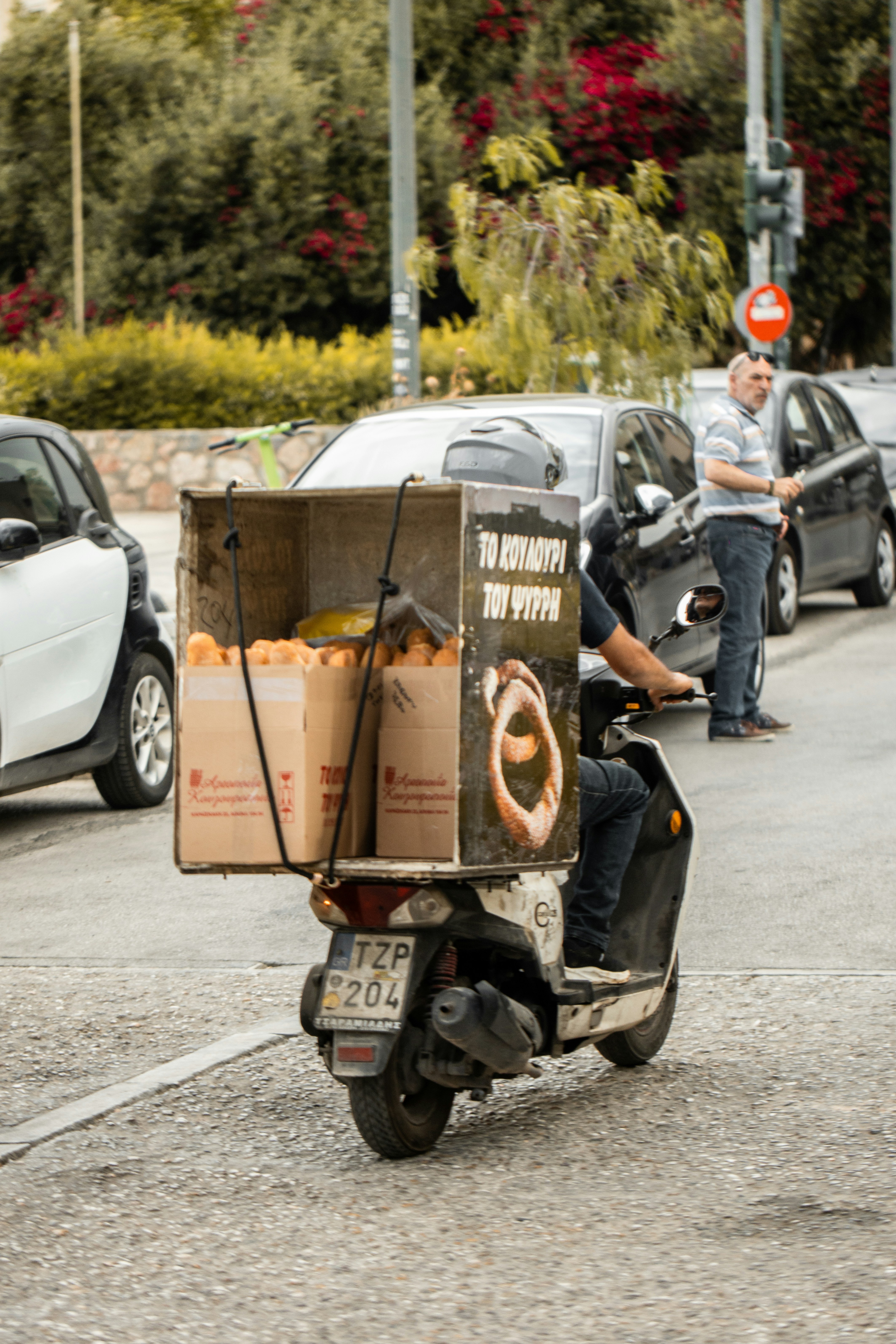 Scooped by the Snack Cart: A Market Rider on a Sunlit Street