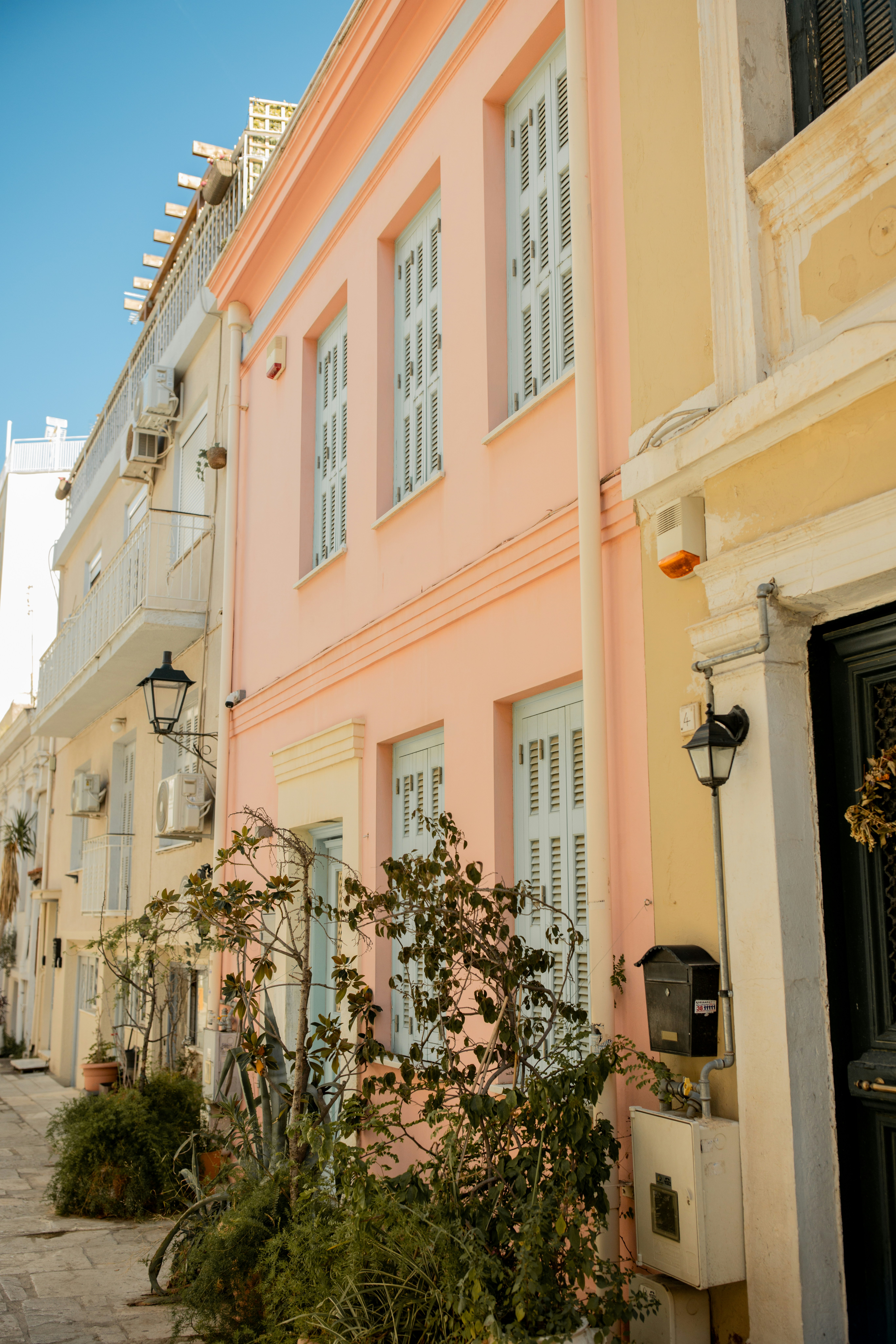 Pastel-Quiet Alley: Facades of a Mediterranean Street