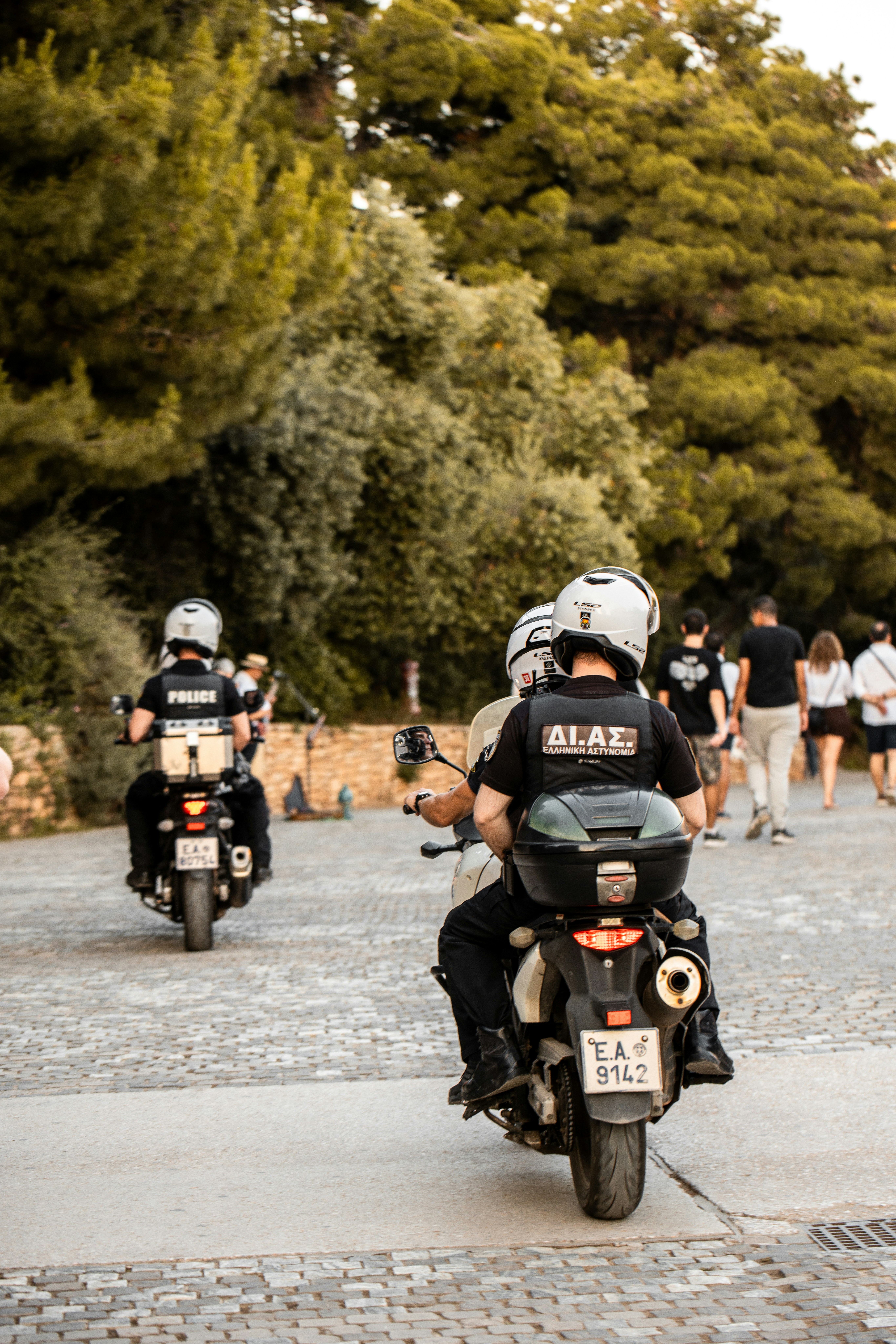 Ride at the Riverside: Police on Dual-Mission in a Crowded Square