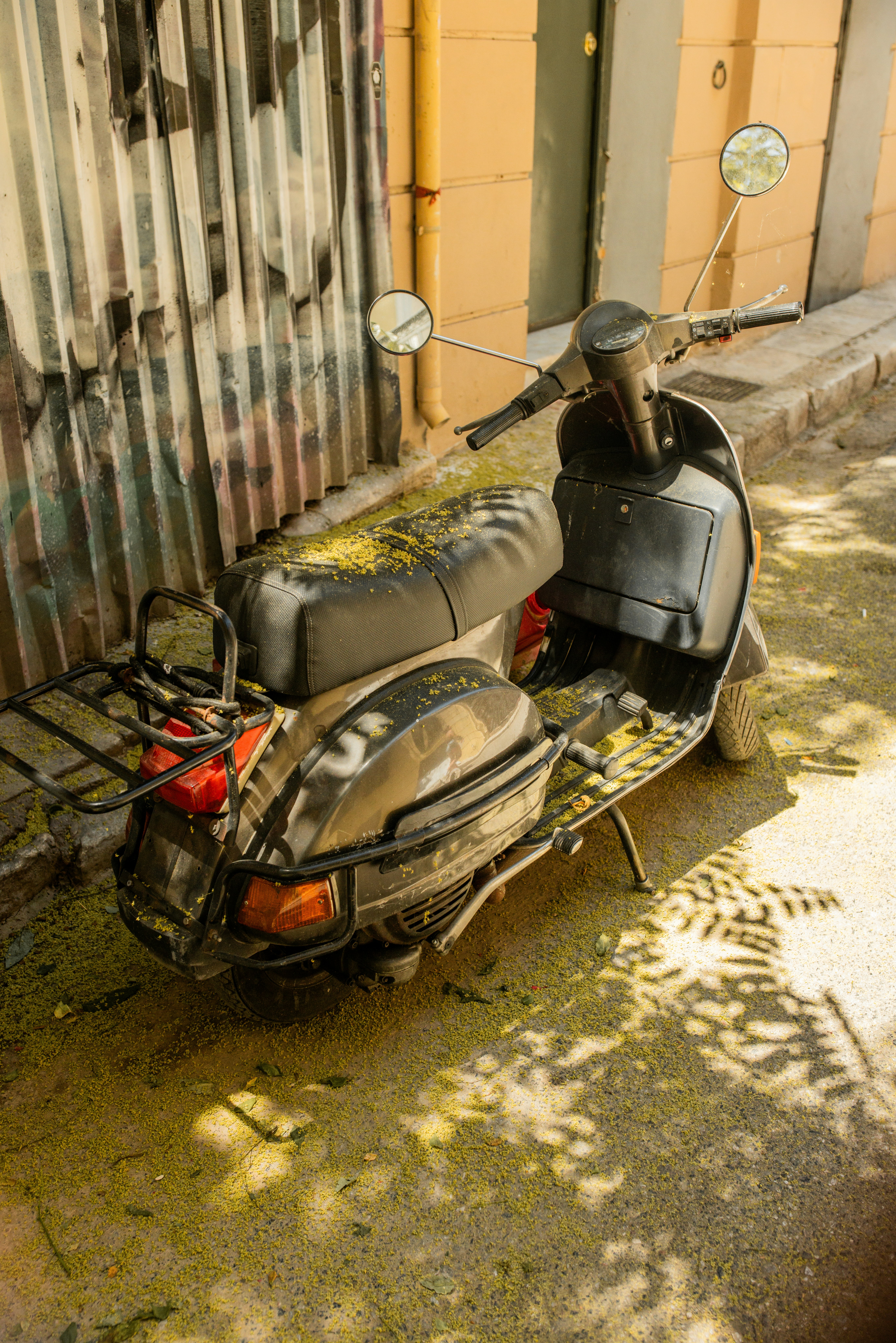 Sunlit Vespa in a Quiet Backstreet