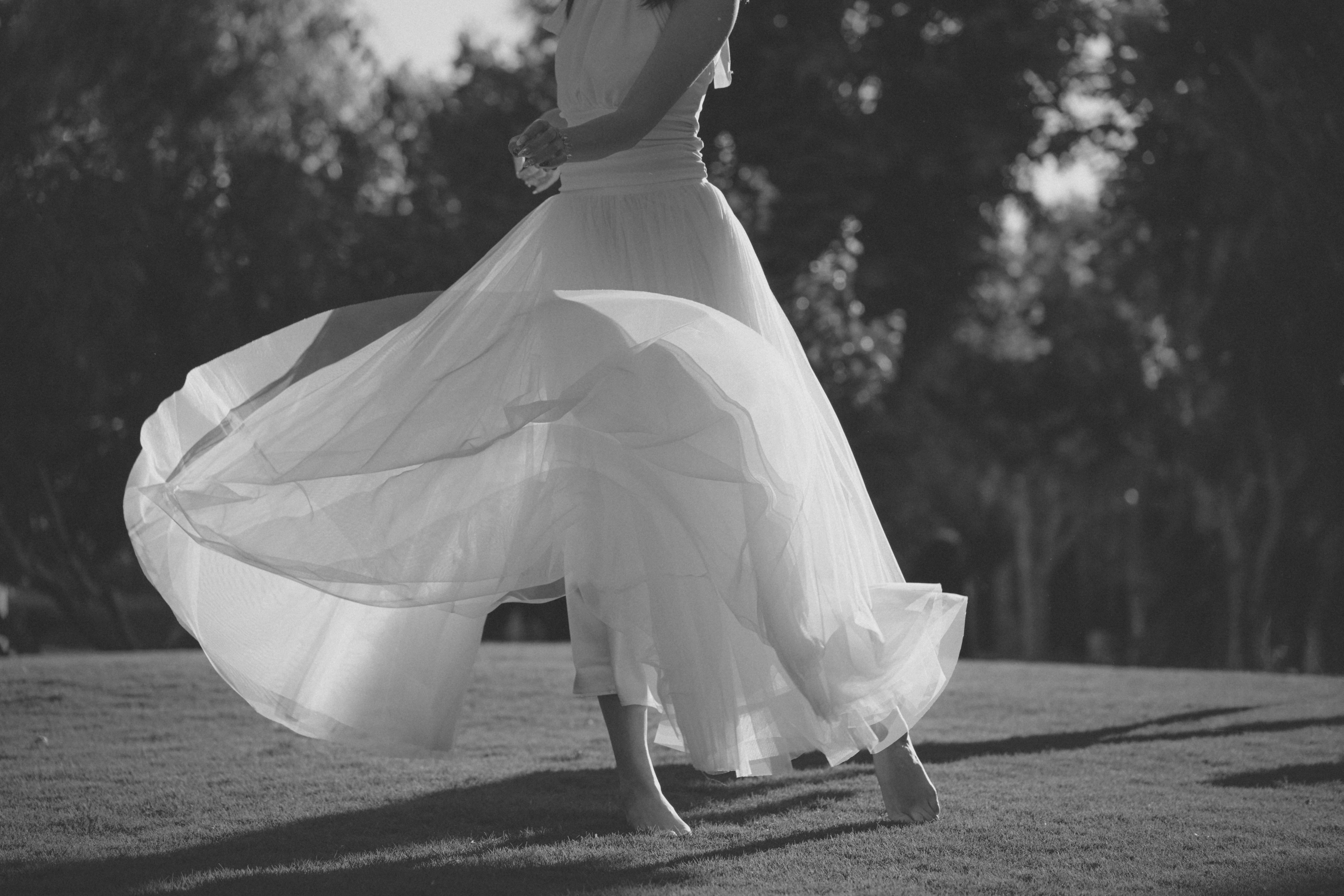 Whispering Veil: A Bride's Wind-Swept Motion