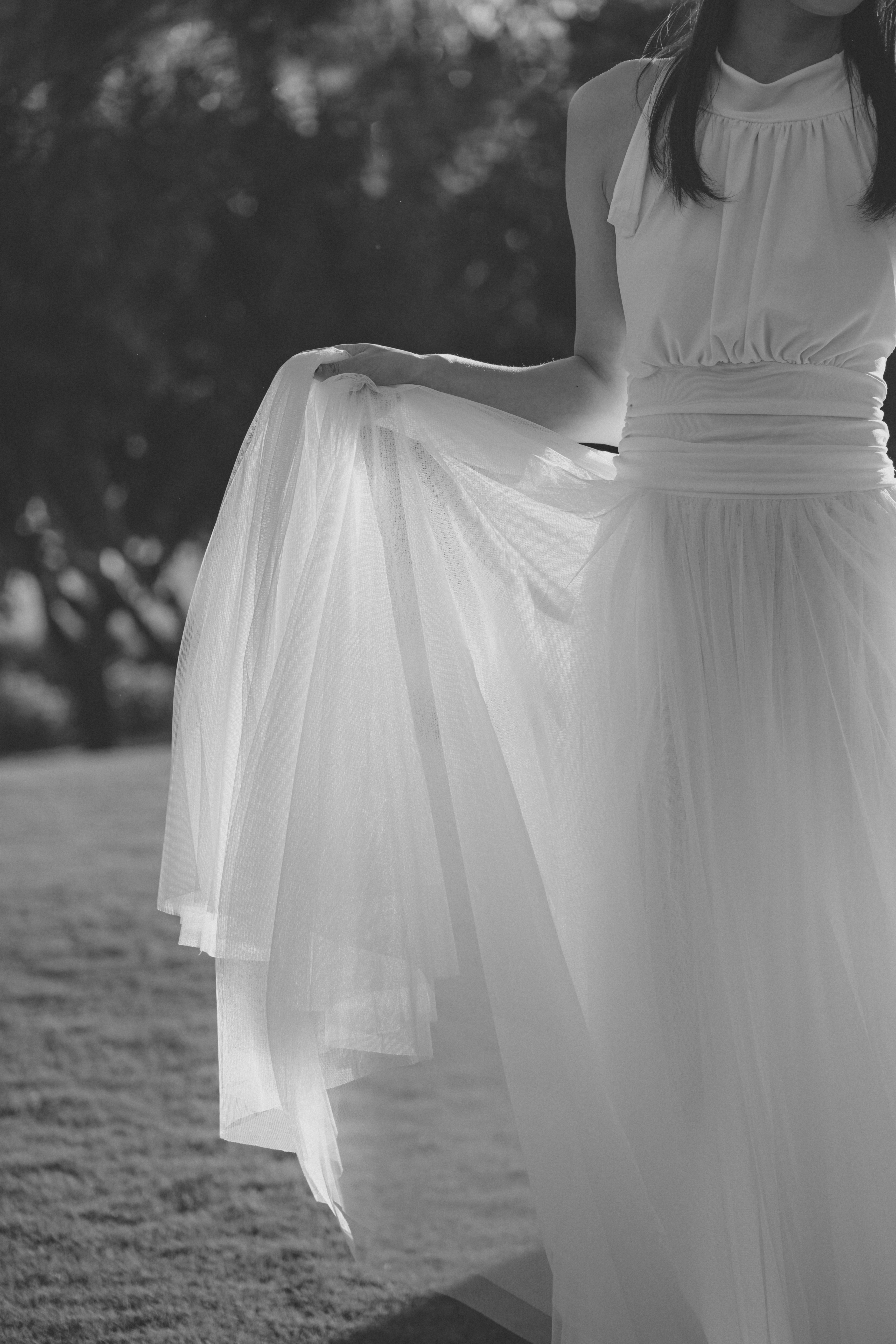 Ethereal Whisper: A Bride’s Veil in Dappled Light