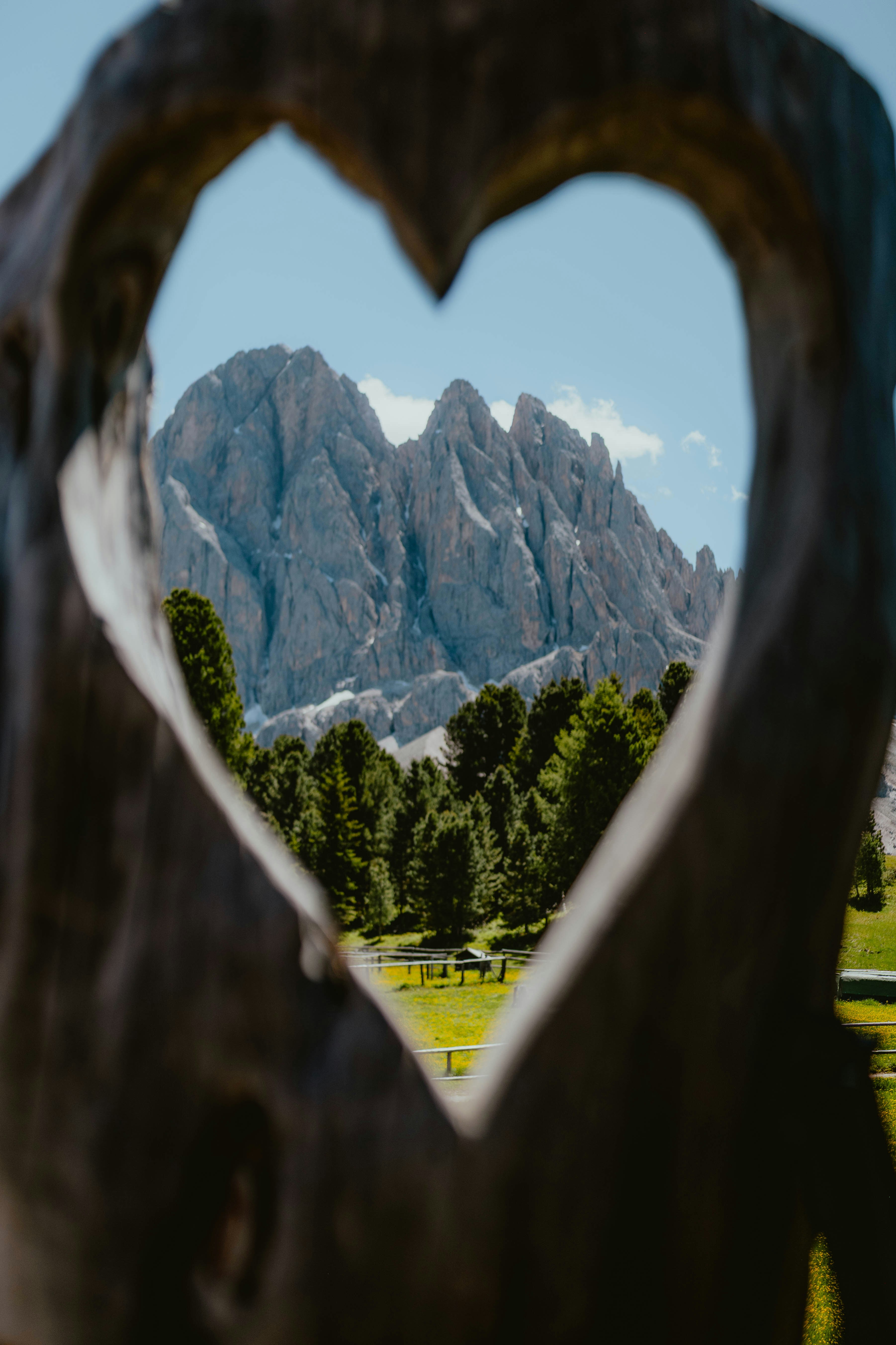 Heart of the Valley Framed by a Weathered Gate