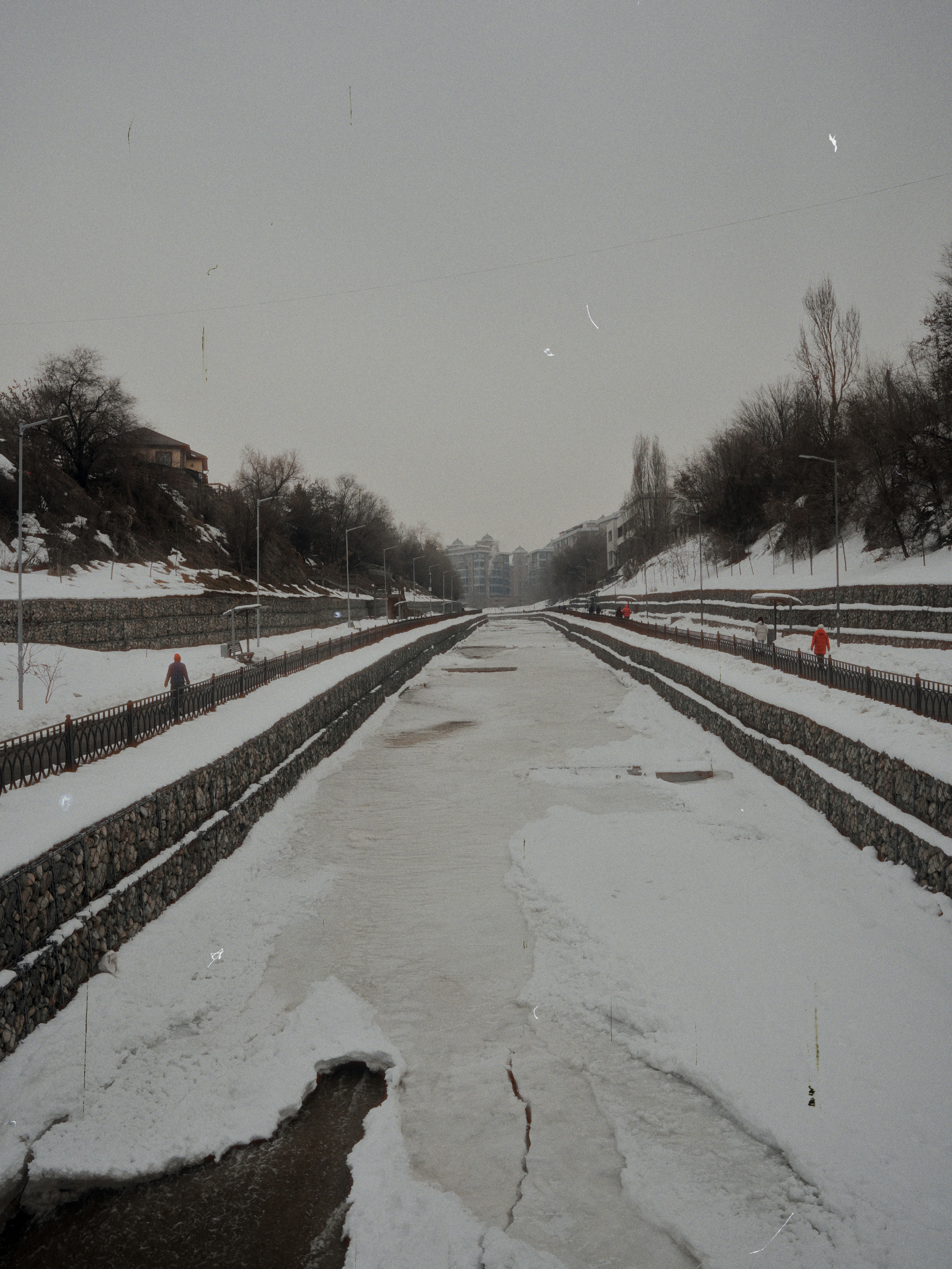 Winter Channel Down the Snow-Covered Canal