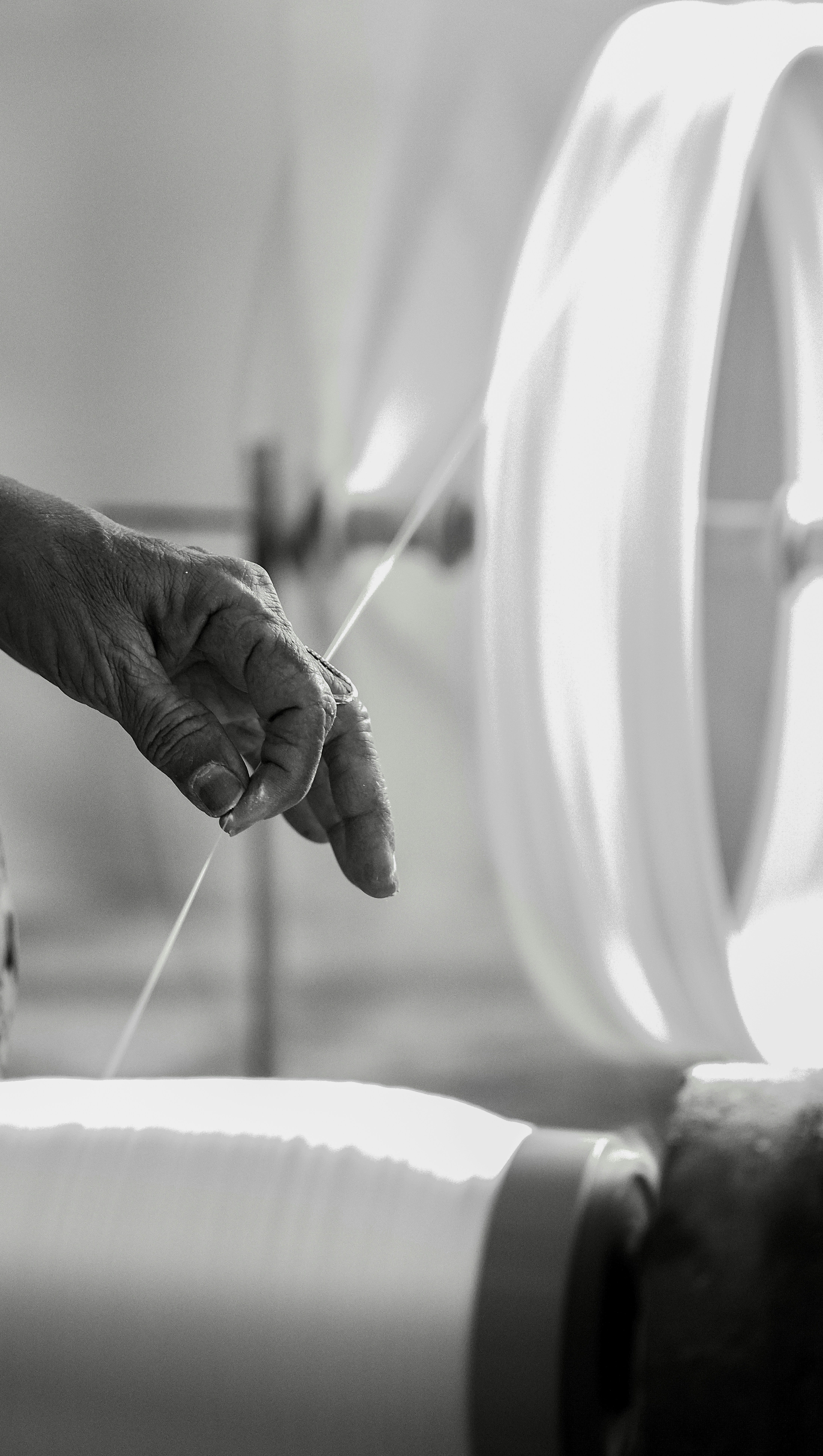 Threading Time: The Quiet Hand guiding a spool