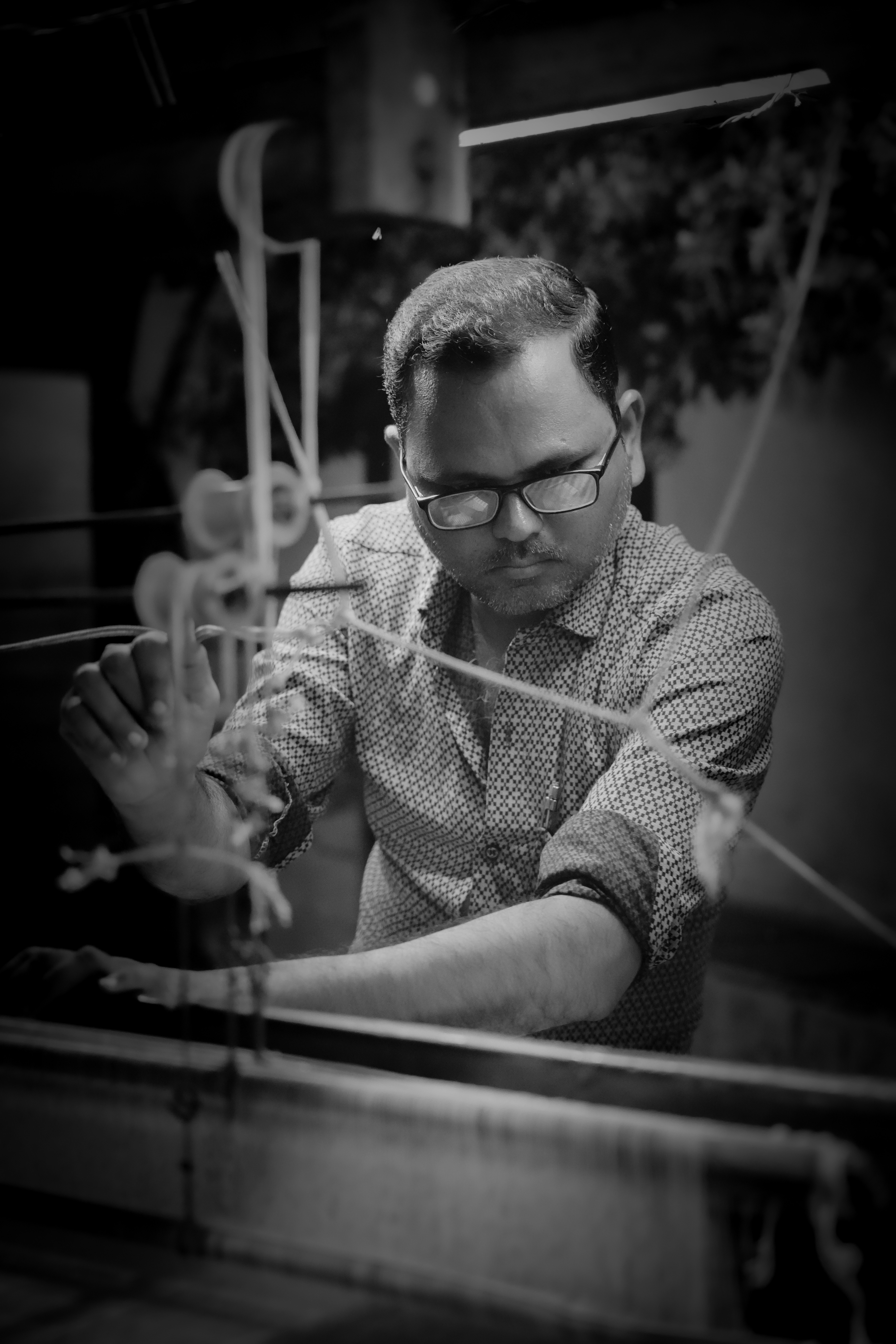 Hands at Work: A Portrait in Quiet Focus Inside a Technical Studio