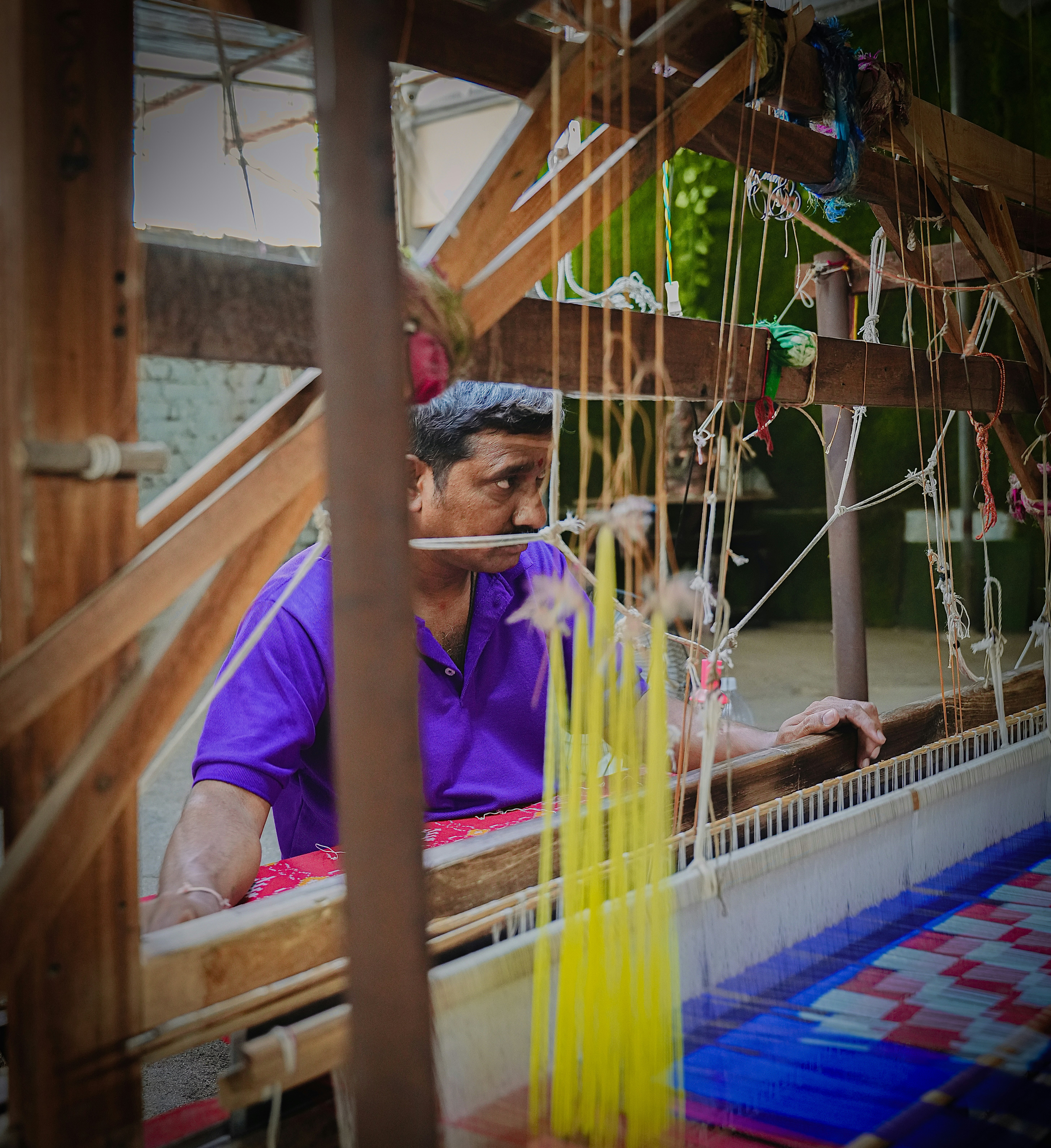 Weaving Focus: A Craftsman at the Loom