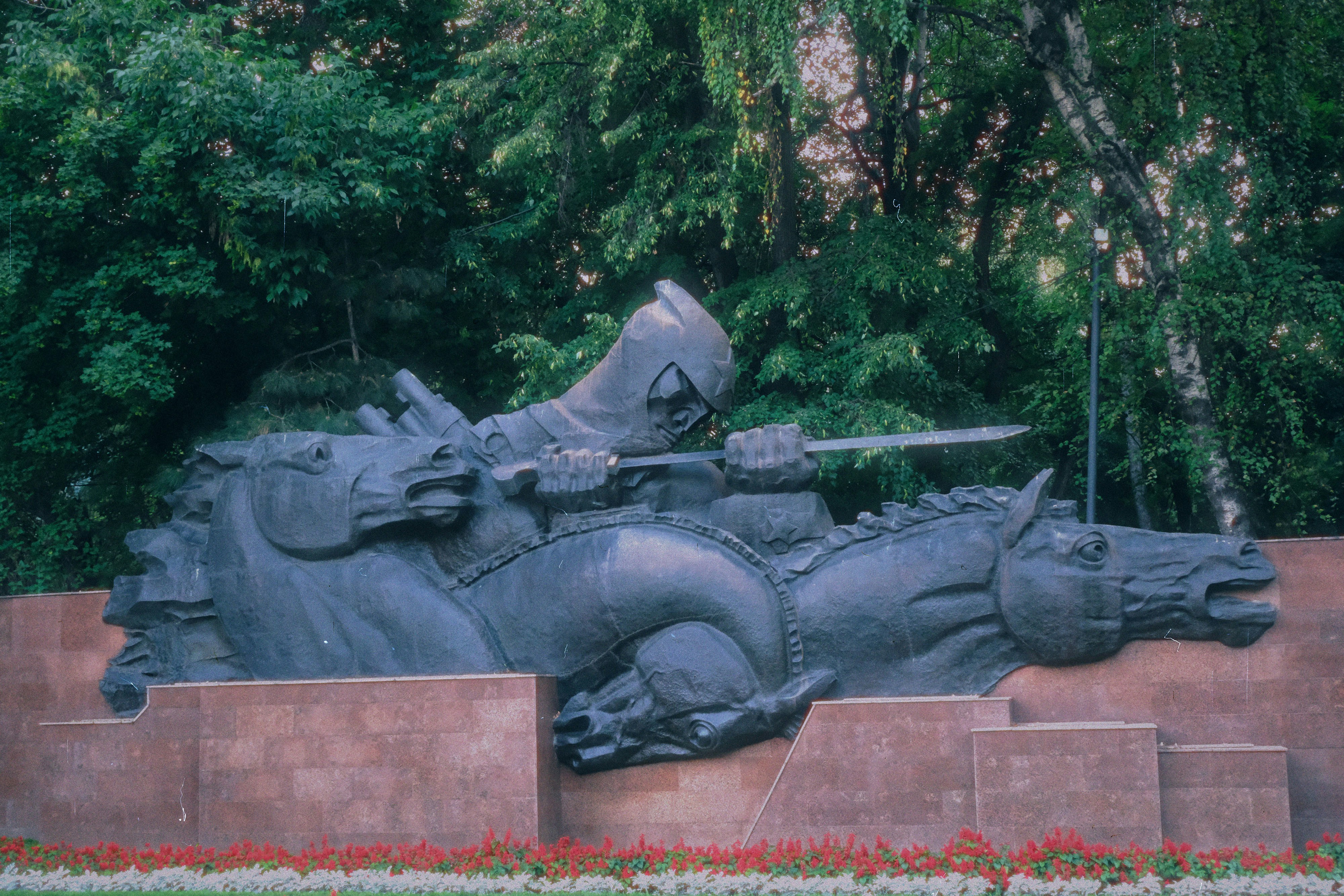 Colored Stone Warhorse: A Sacred Dragon-Tailed Sculpture in Red Terrace