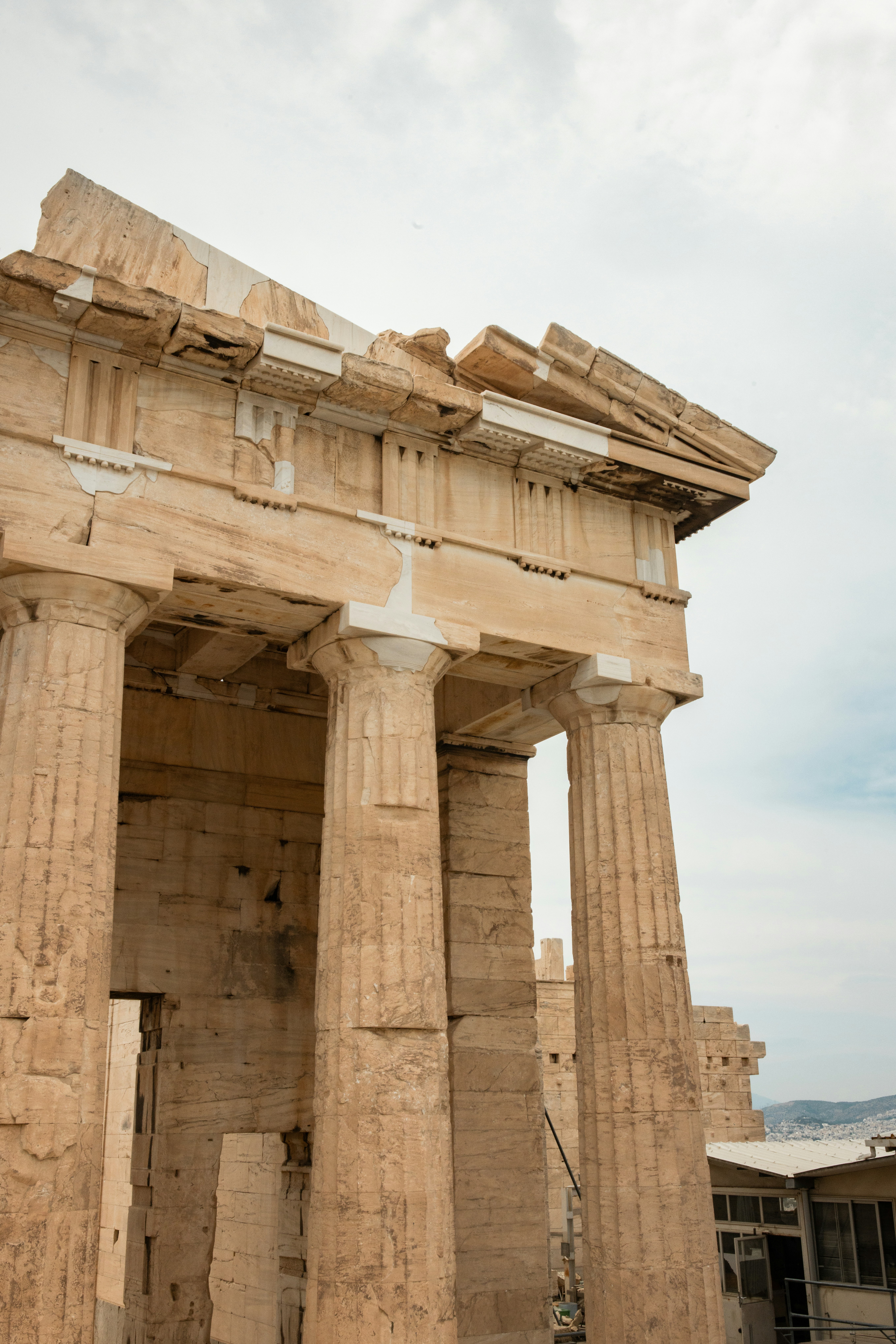 Torso of Time: Ancient Columns Against a Bright Sky