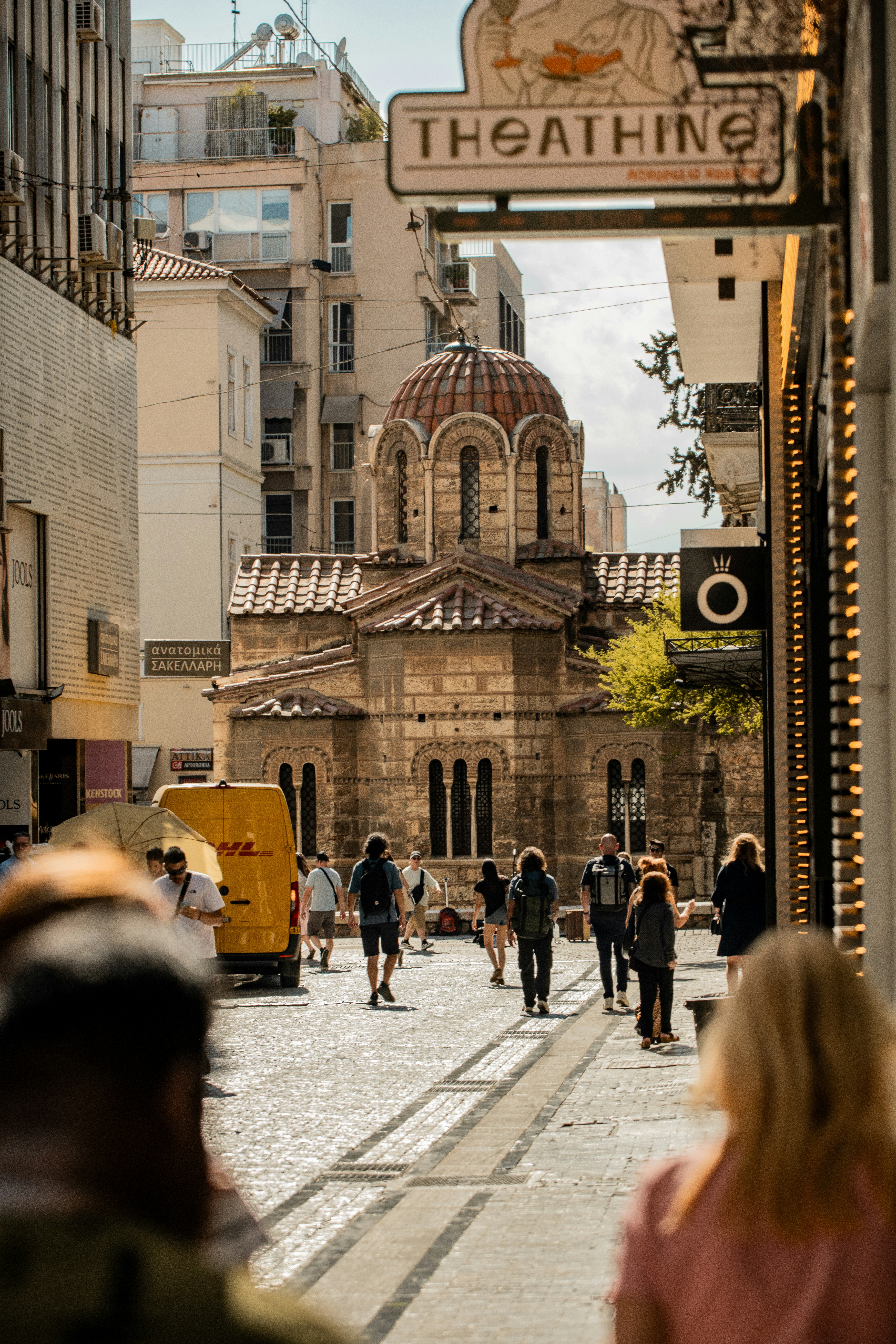 Temple in the Street: A Pedestrian Alley Framed by Urban Life