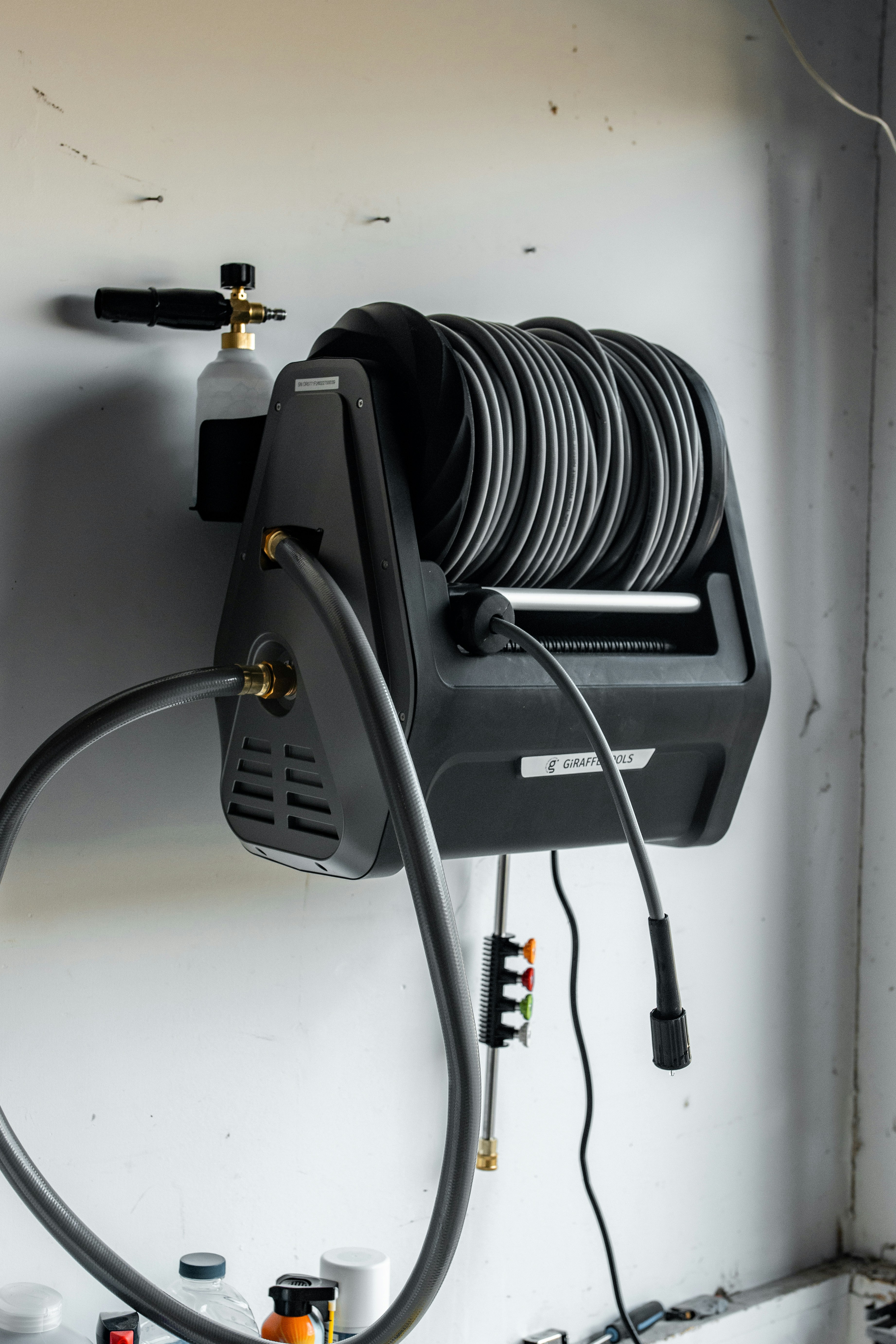 Industrial Hose Reel with Coiled Cable in a Workshop