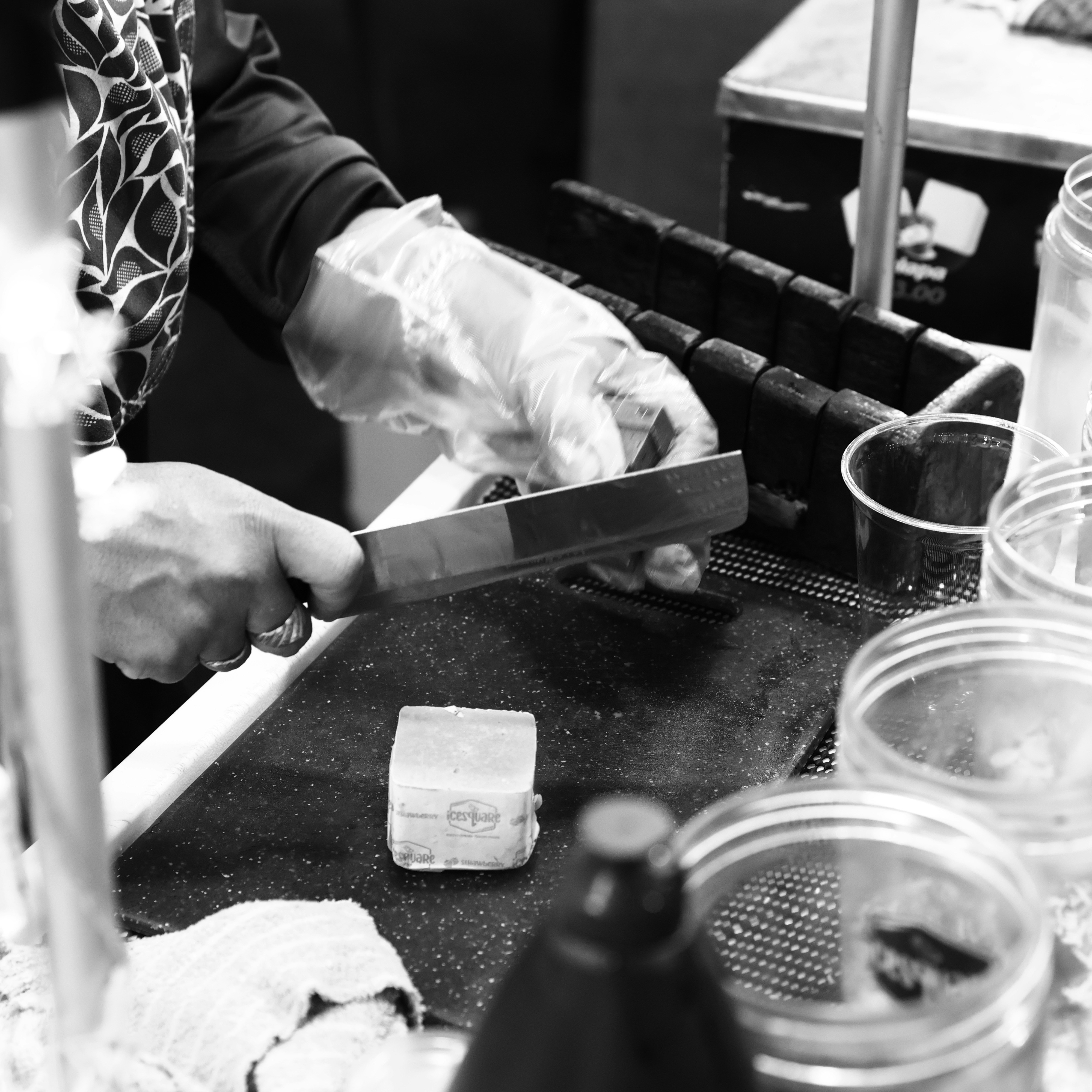 Precision blades and careful hands: a chef’s cut in monochrome