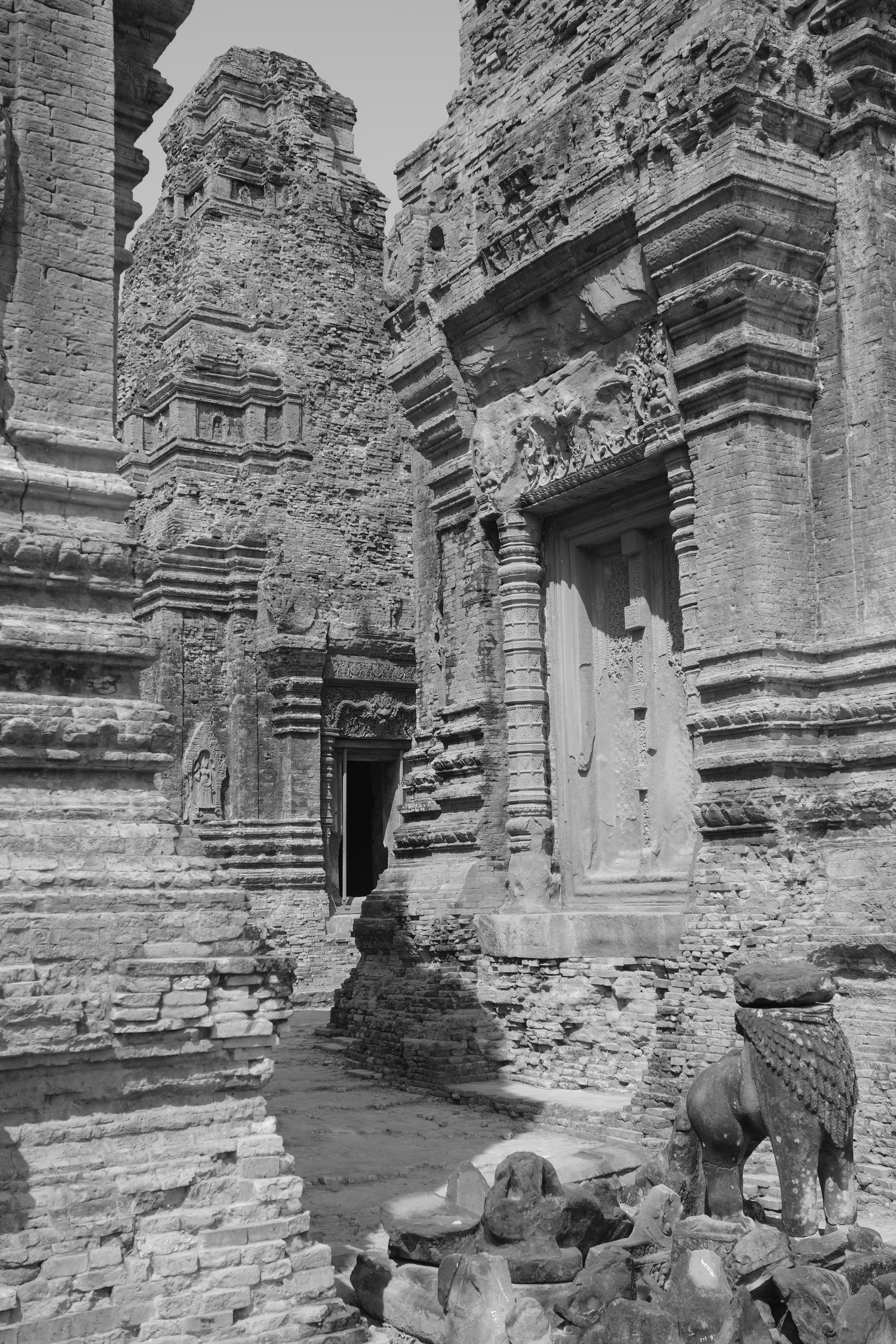 Stone Carved Silence: An Ancient Temple Courtyard in Rain-Soaked Light